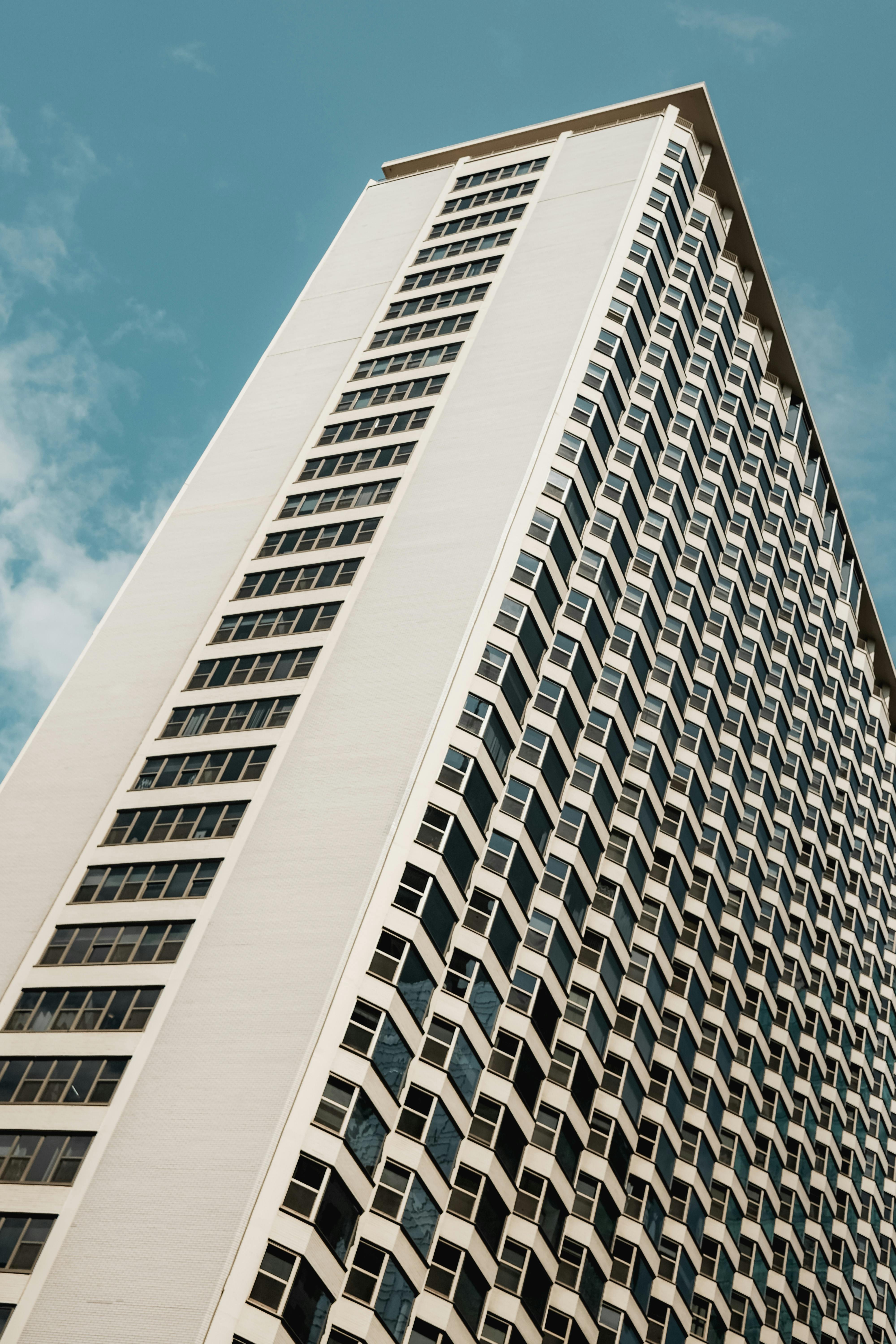 Modern Skyscraper with Blue Sky Background · Free Stock Photo