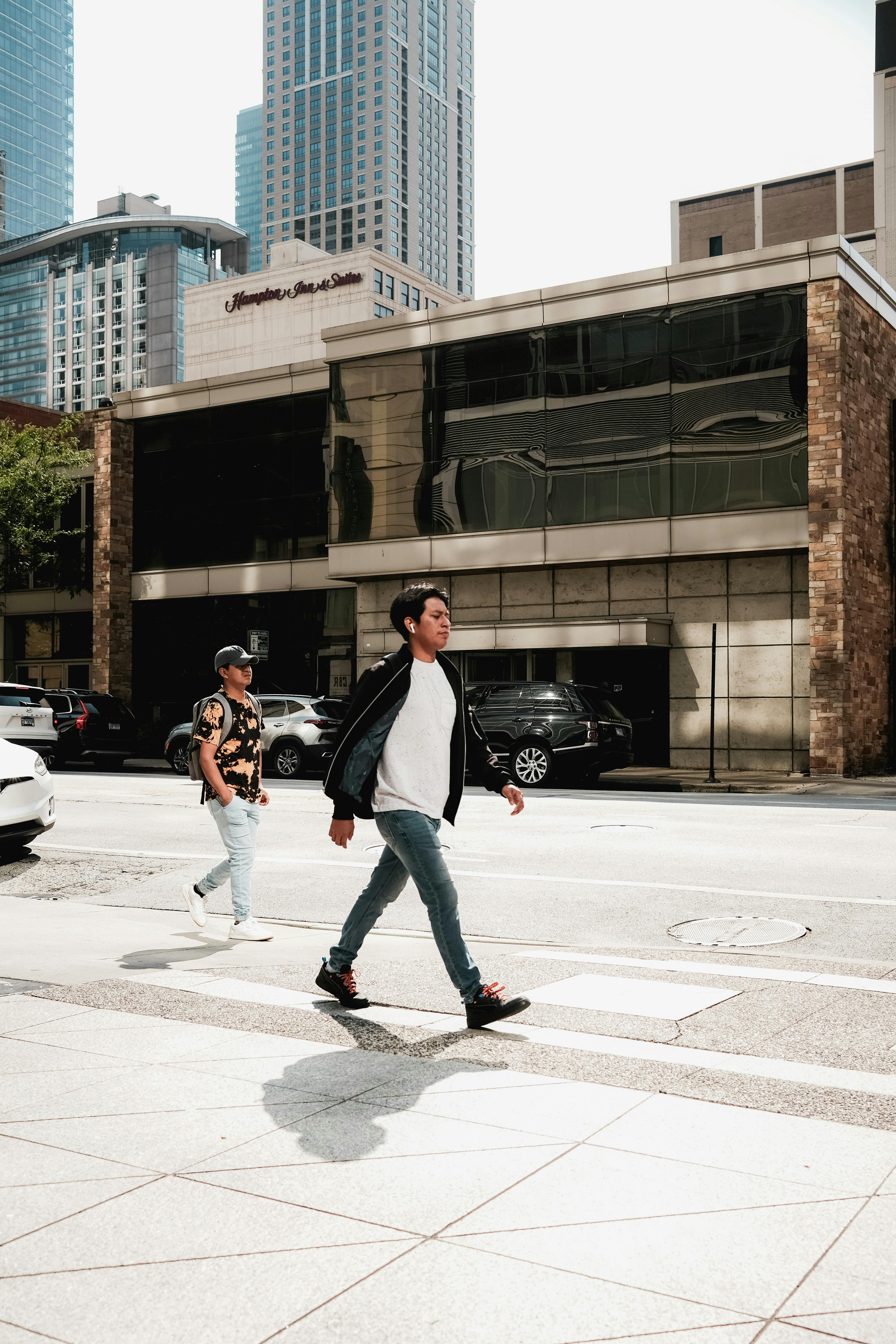 Urban Street Scene with People Crossing Road · Free Stock Photo