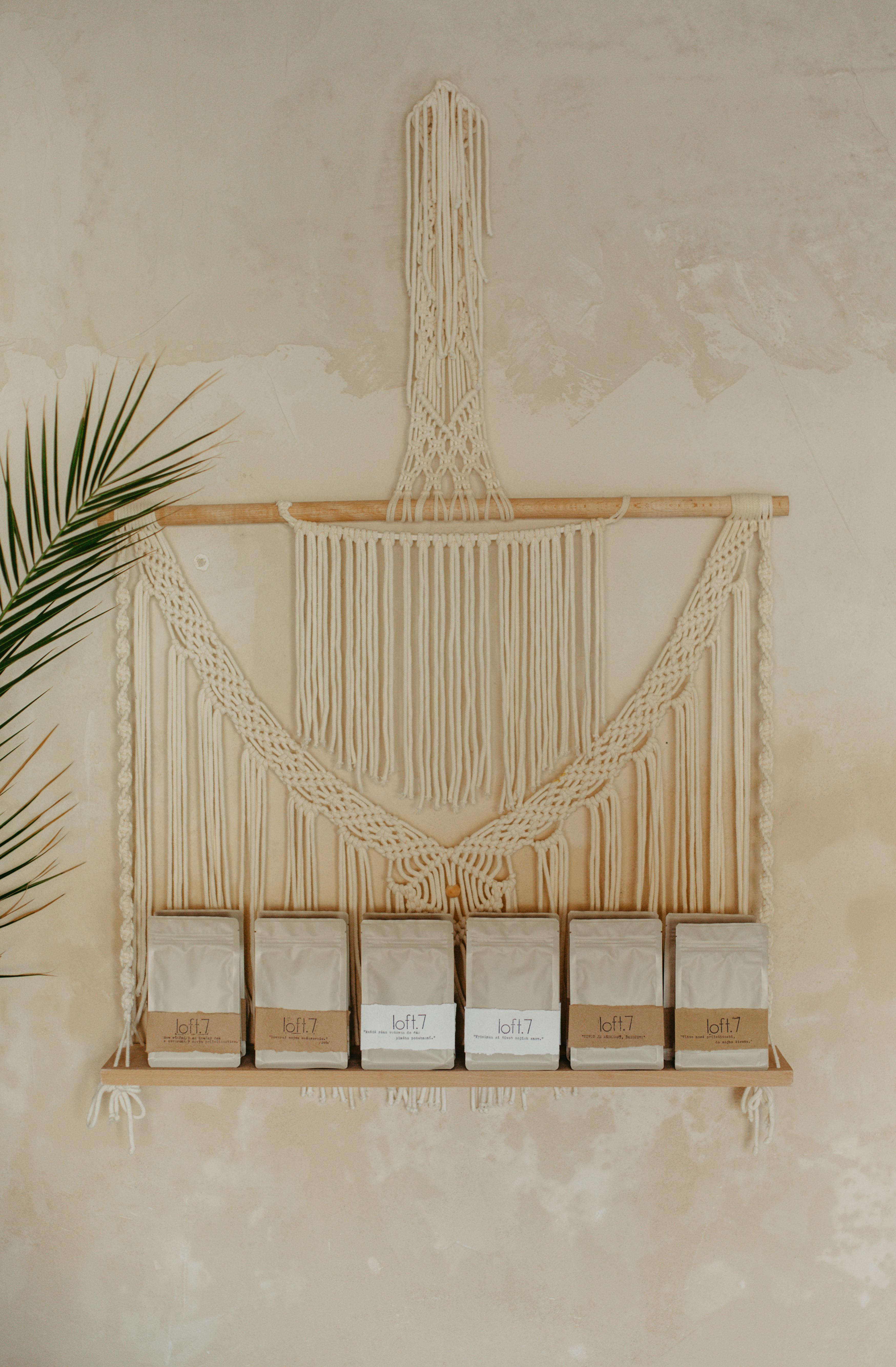 Artisanal Coffee Display with Macrame Decor · Free Stock Photo