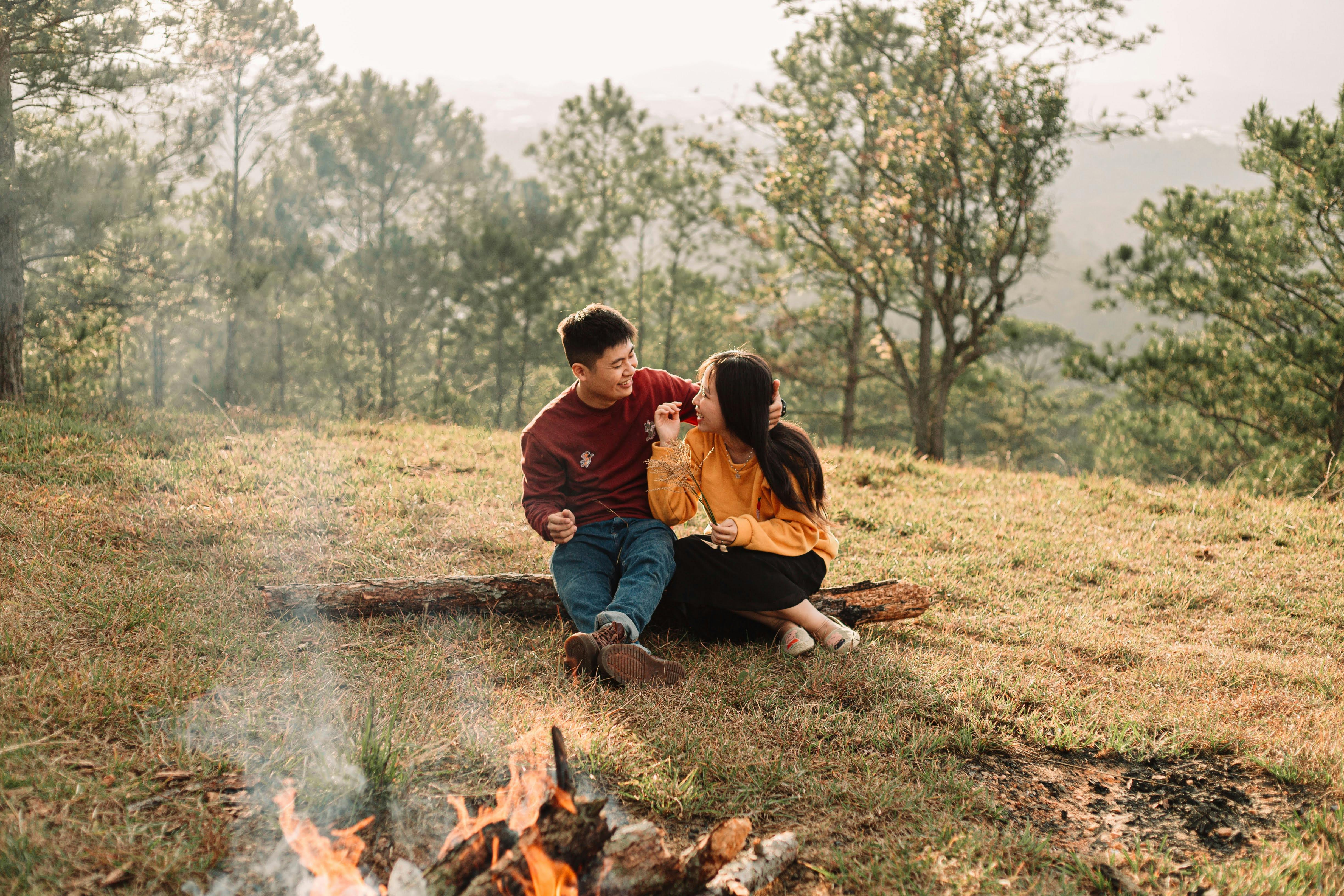 Young Couple By Campfire Photos, Download The BEST Free Young Couple By Campfire Stock Photos ...