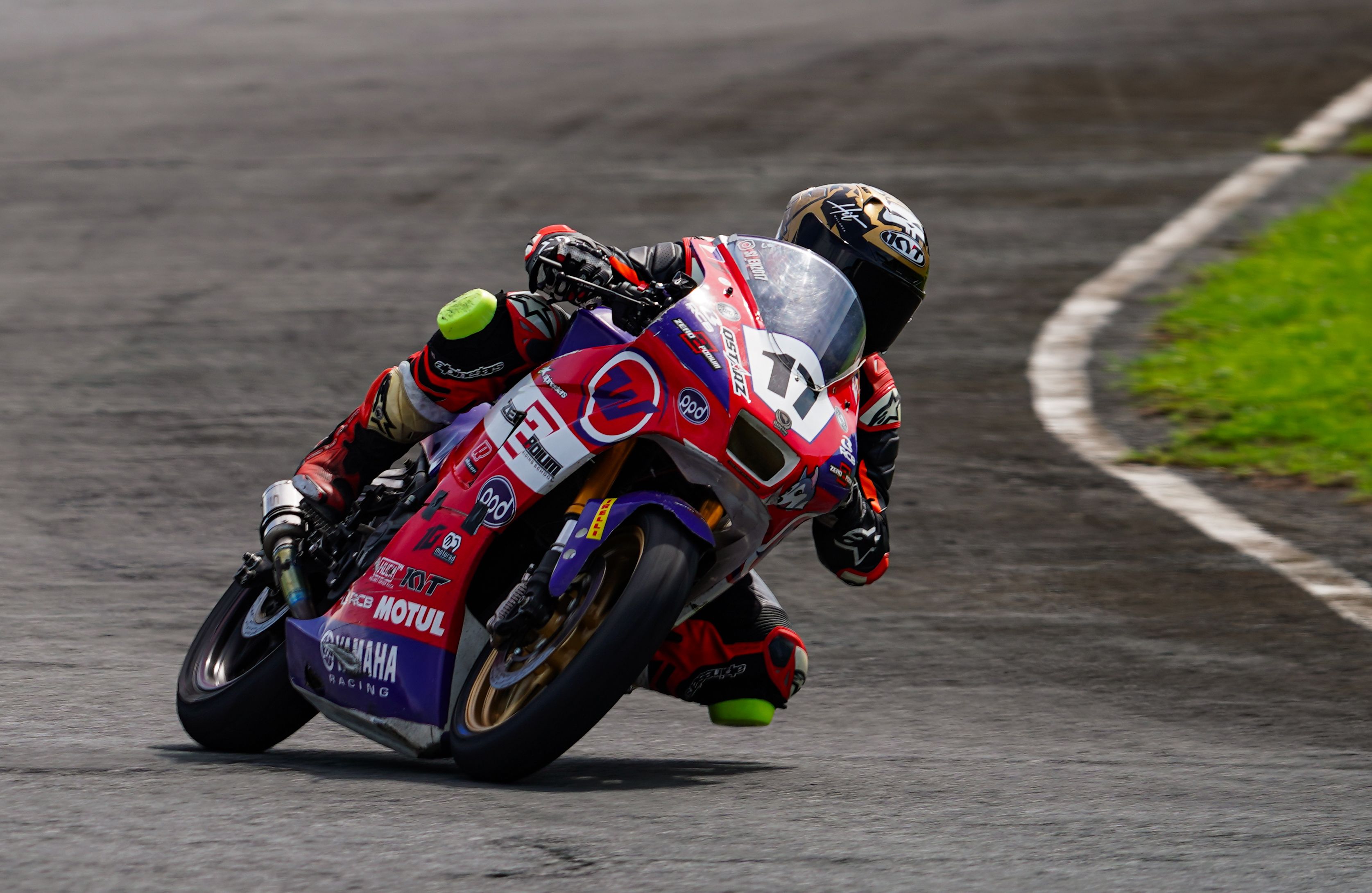 Professional Motorcycle Racer in Action on Track · Free Stock Photo