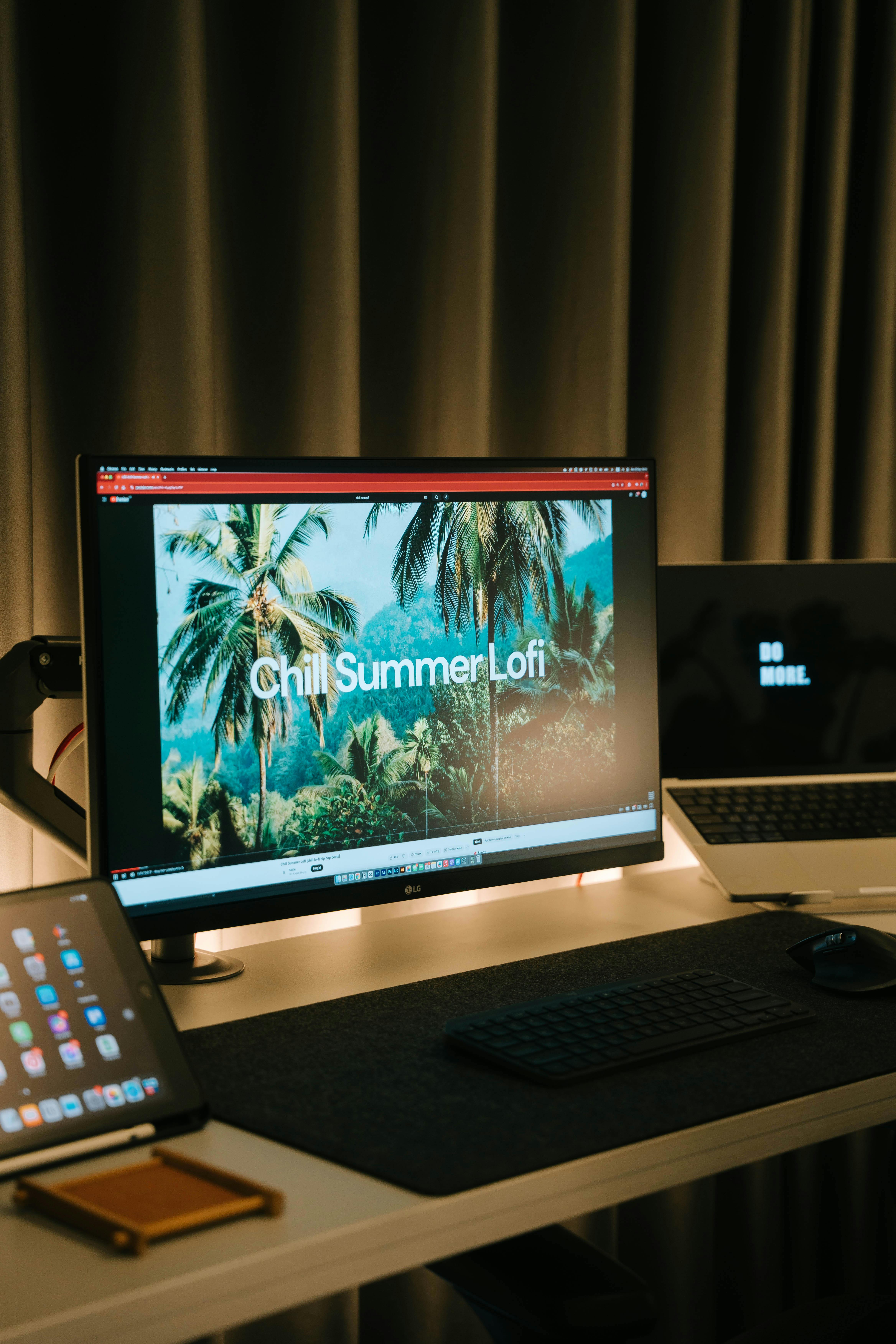 Modern Workspace with Chill Summer Lofi Display · Free Stock Photo