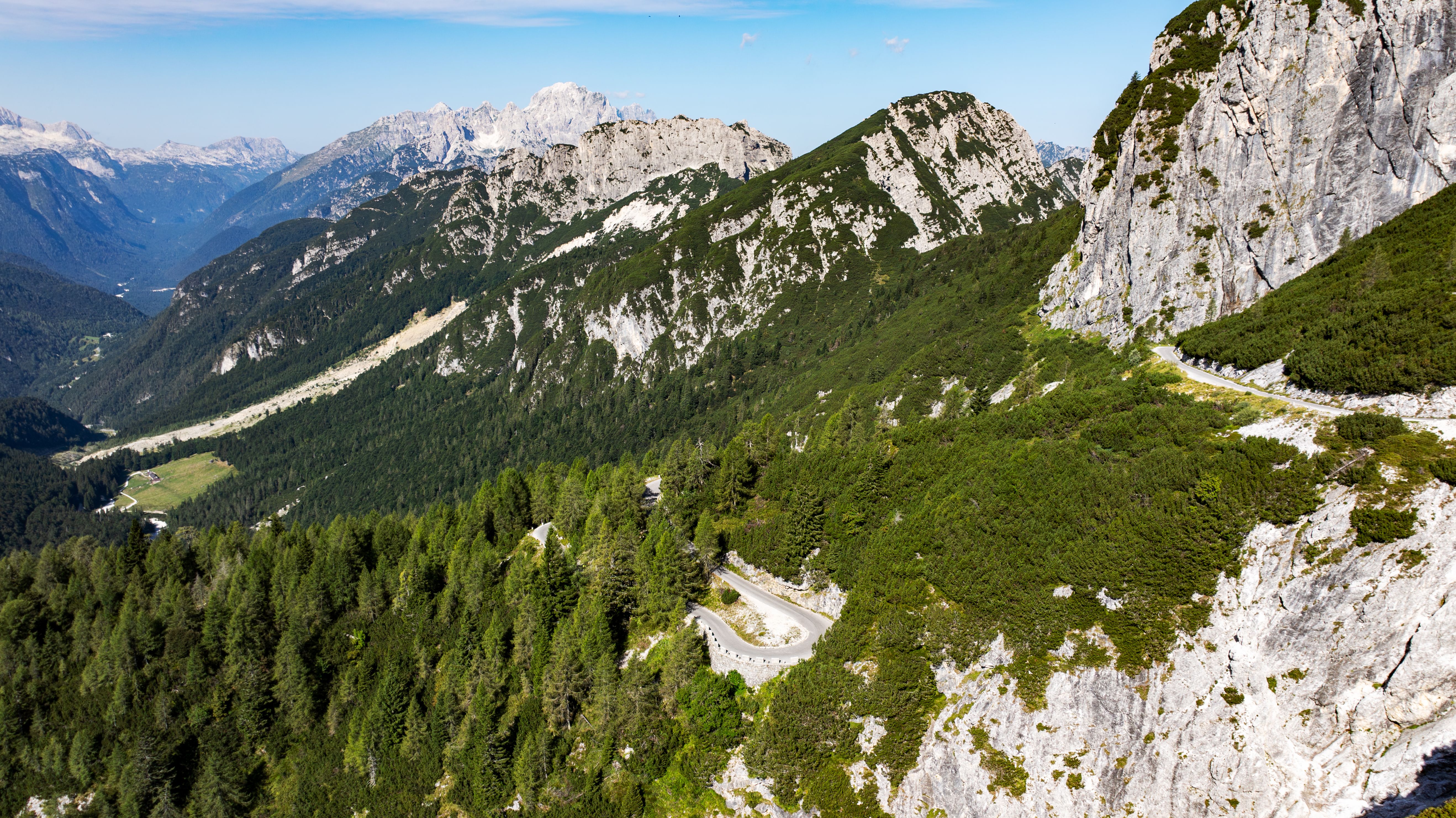 Scenic Alpine Roads in Majestic Mountain Range · Free Stock Photo