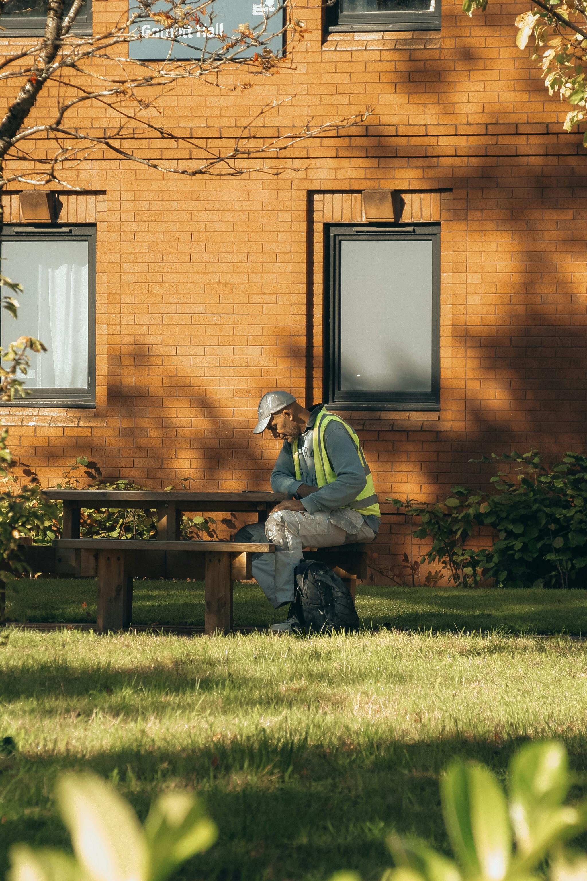 Construction Worker Taking a Break Outdoors · Free Stock Photo