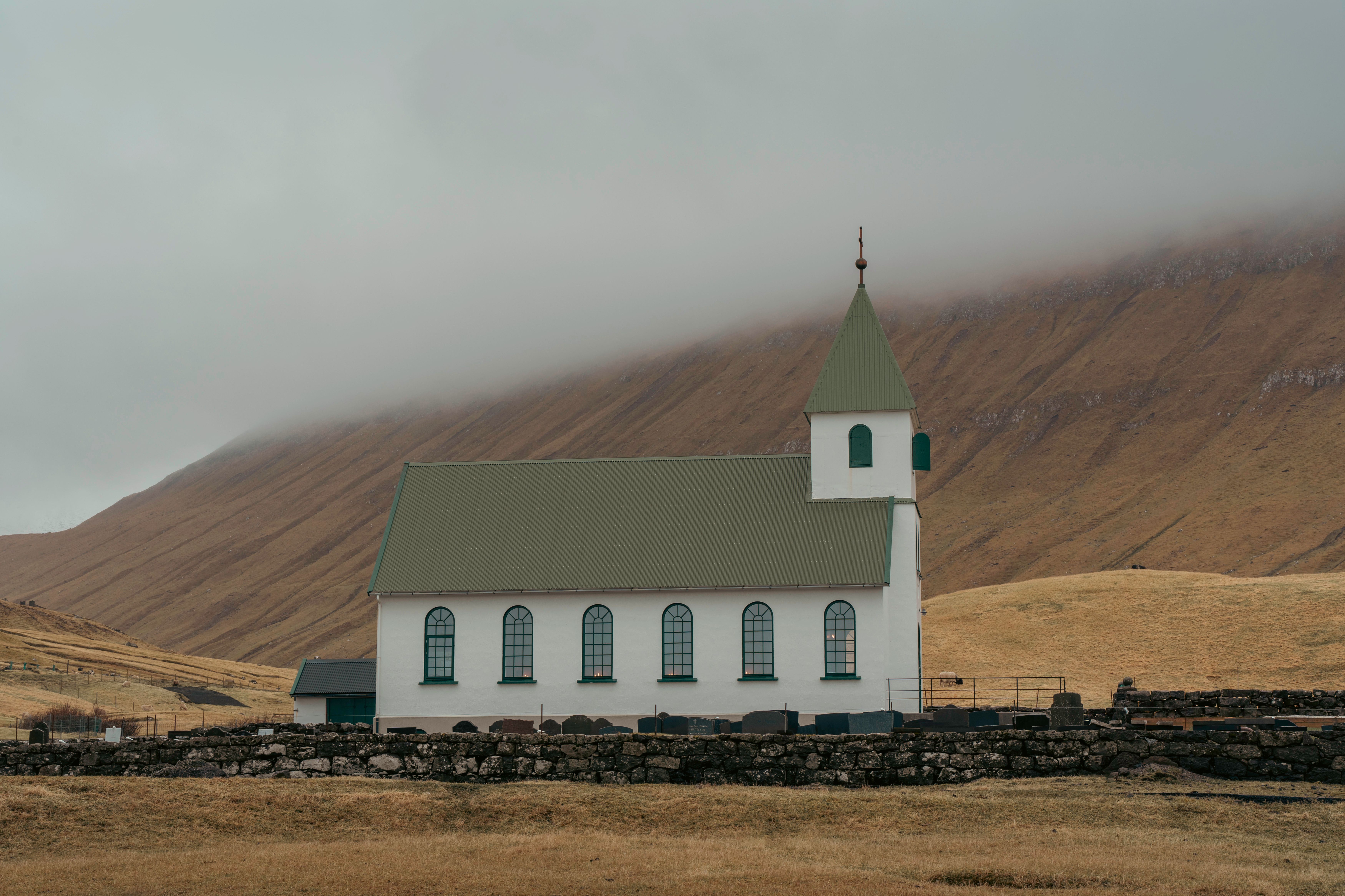 Church in the Open Field Near the Mountain · Free Stock Photo