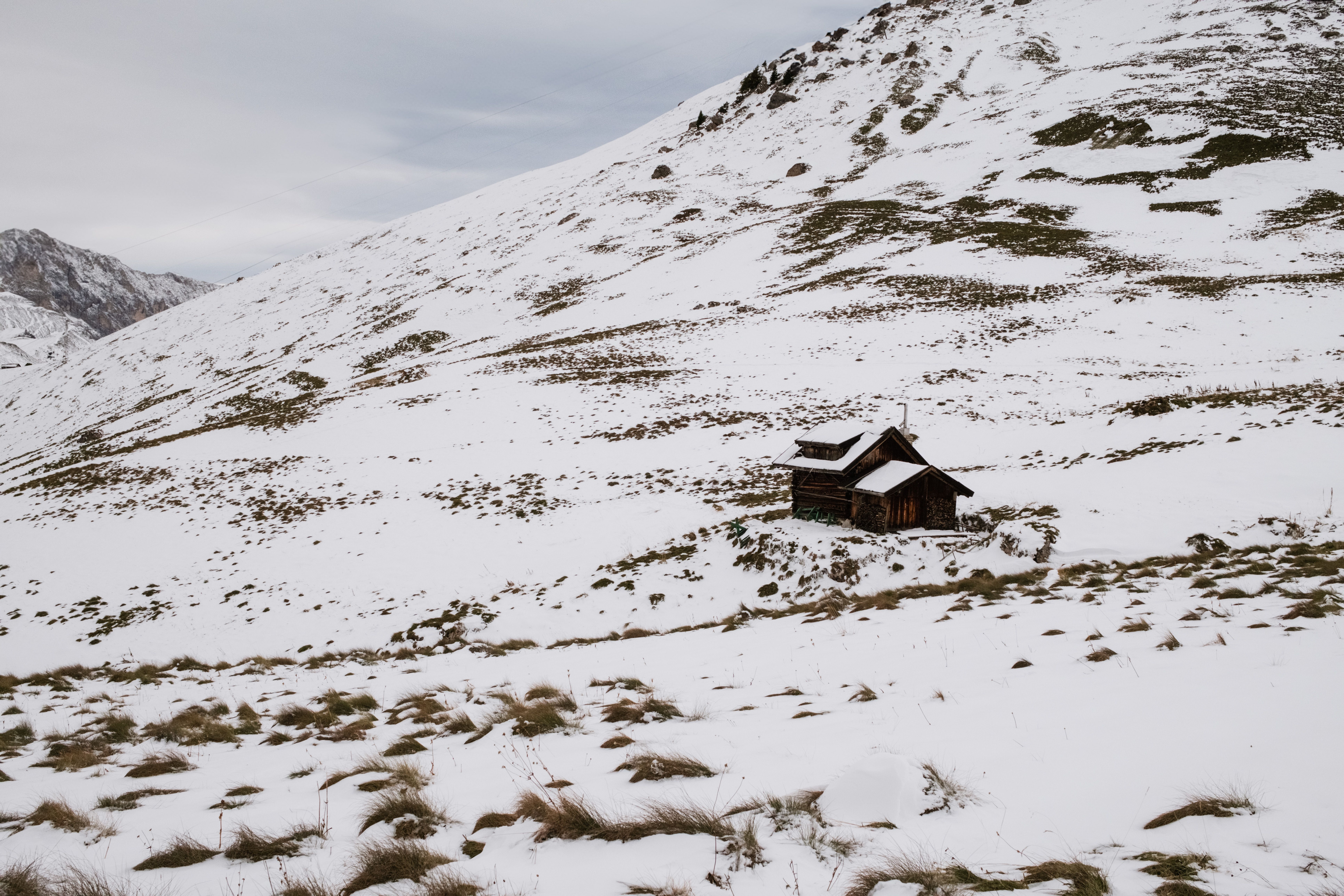 Snowy Alpine Cabin in Canazei, Italy · Free Stock Photo