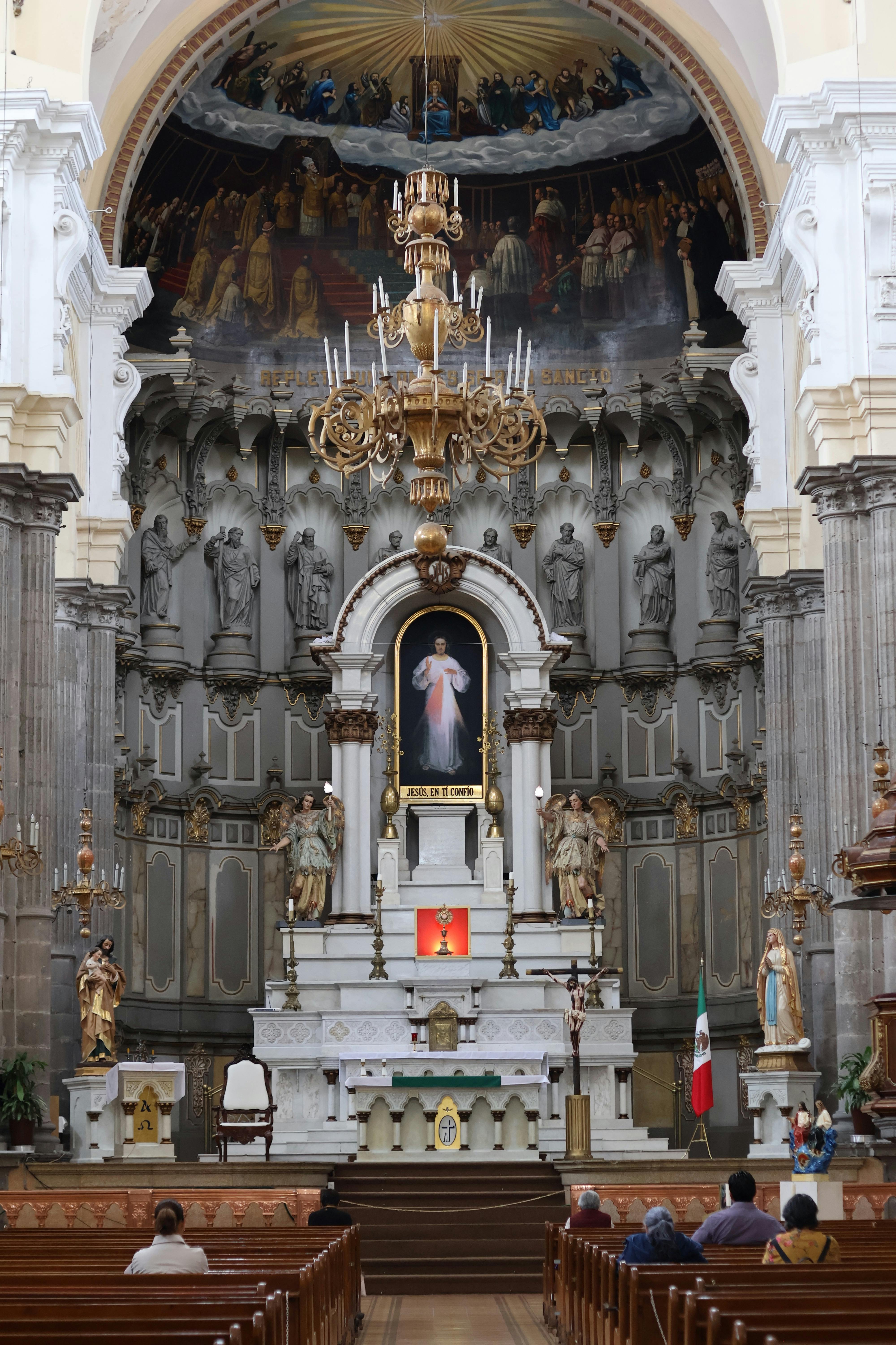 Brown Wooden Church Pew Align Facing the Altar · Free Stock Photo