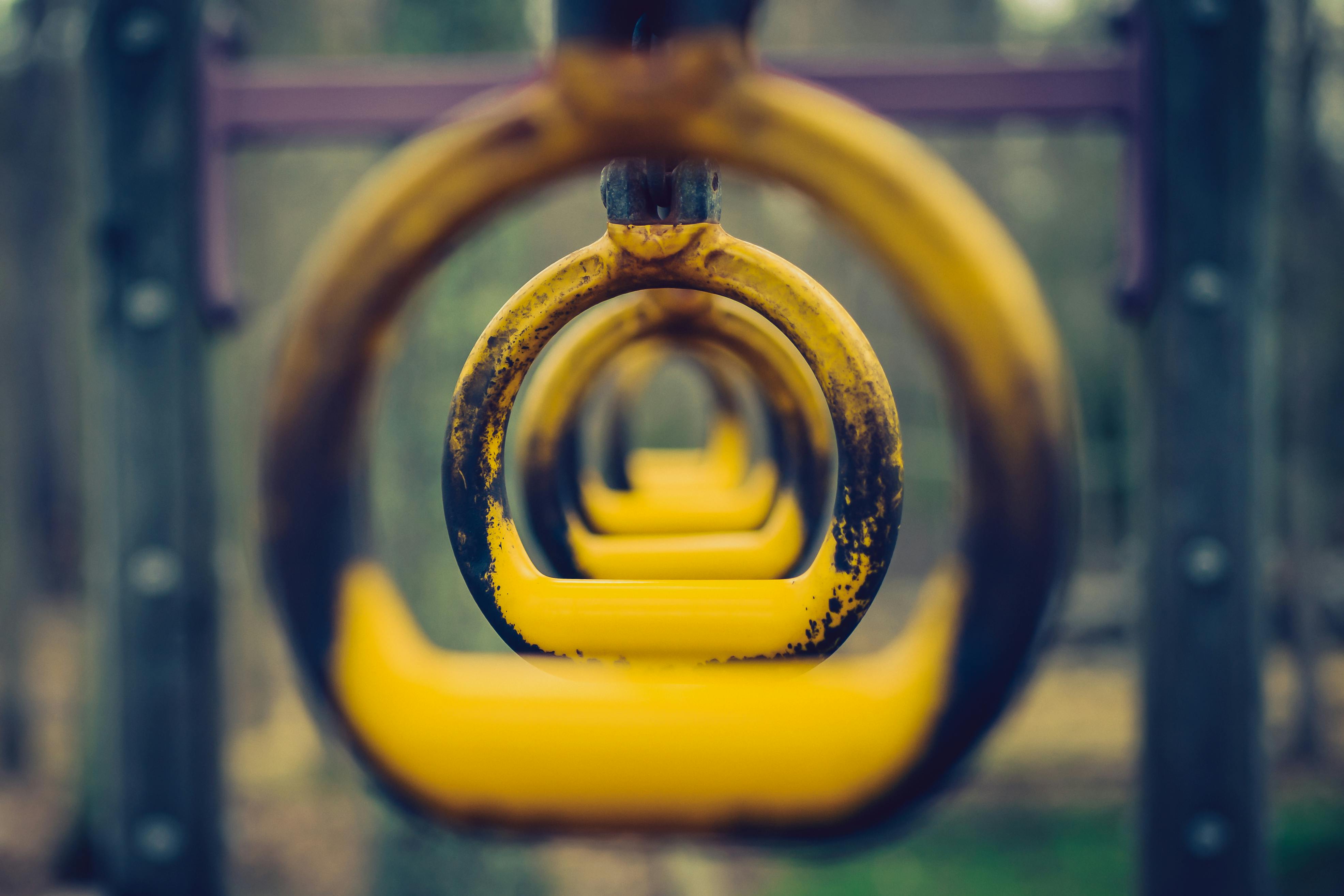 Close-up of Yellow Playground Monkey Bars Outdoors · Free Stock Photo