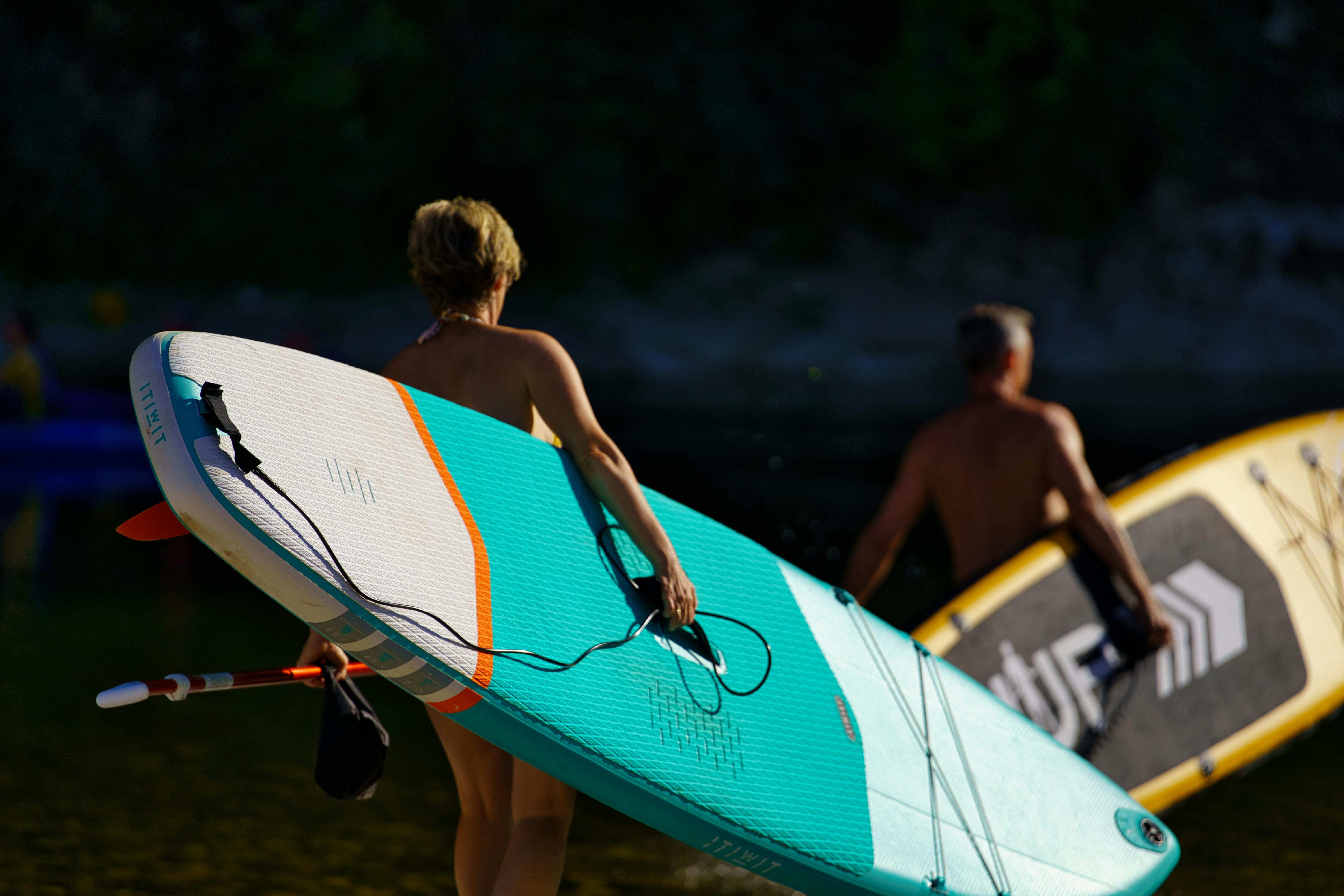 Summer Paddle Boarding Adventure on Lake · Free Stock Photo