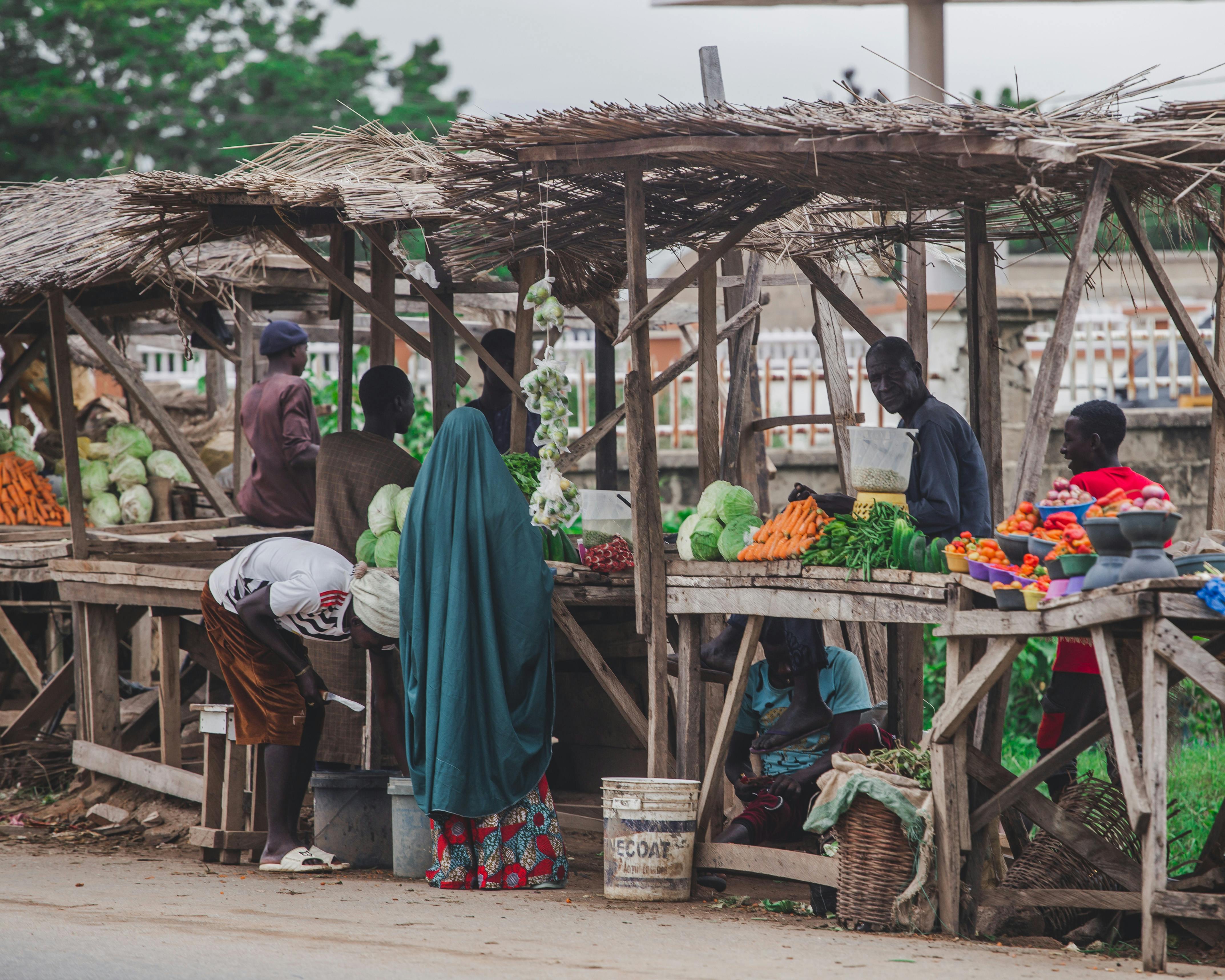 Vibrant Local Market Scene with Fresh Produce · Free Stock Photo