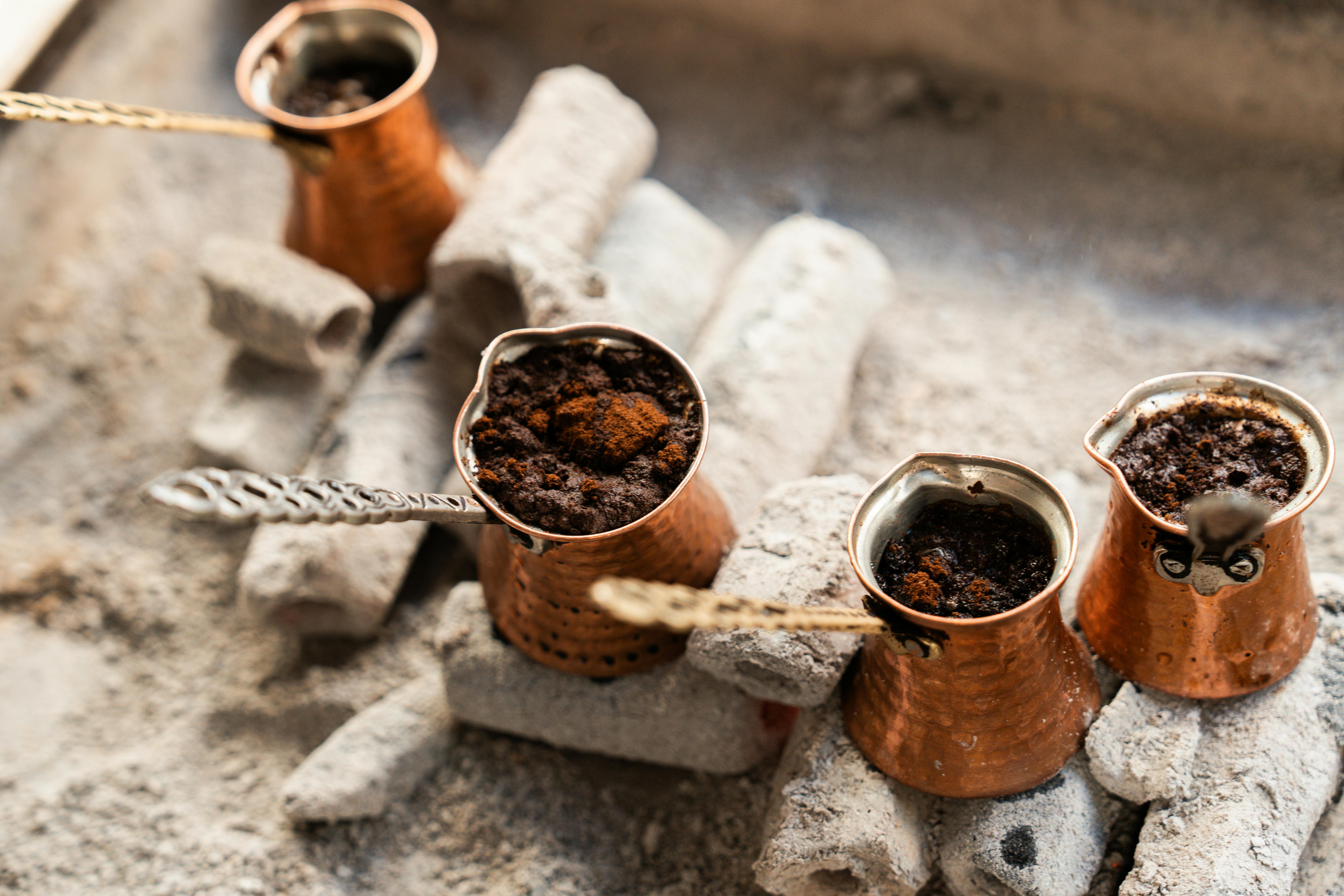 Traditional Turkish Coffee Brewing in Copper Pots · Free Stock Photo