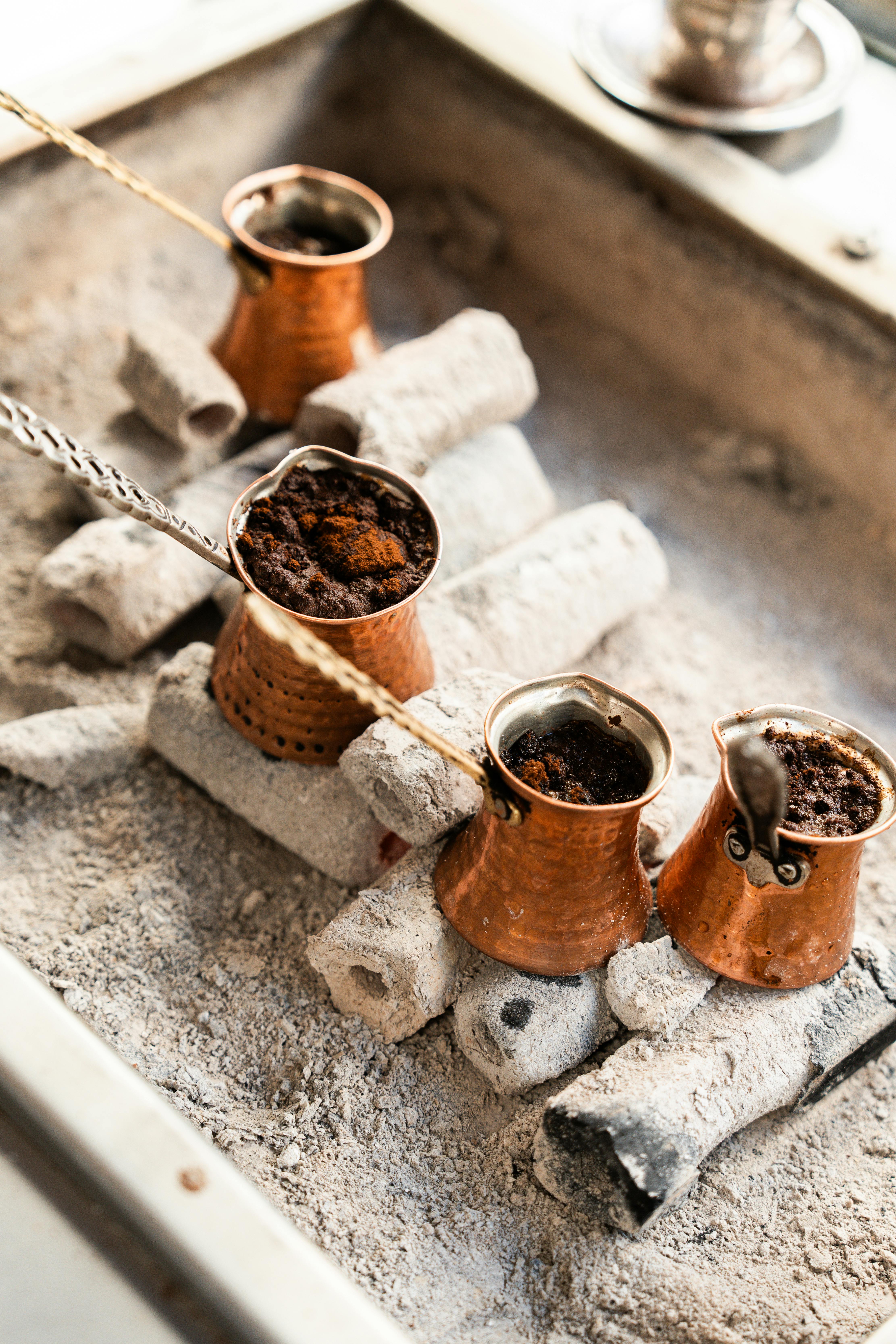 Authentic Turkish Coffee Brewing on Sand · Free Stock Photo