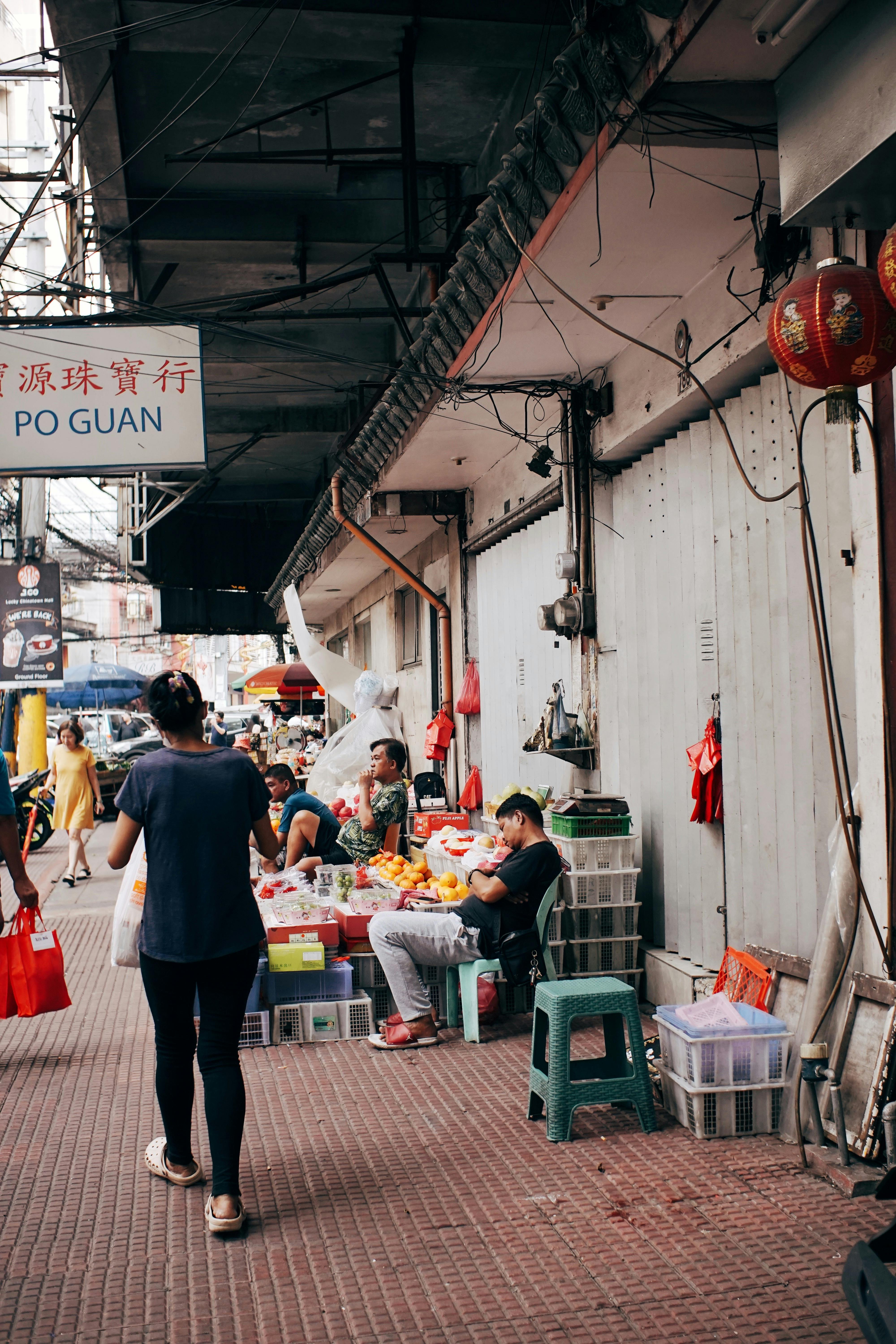 Bustling Street Market Scene in Urban Area · Free Stock Photo