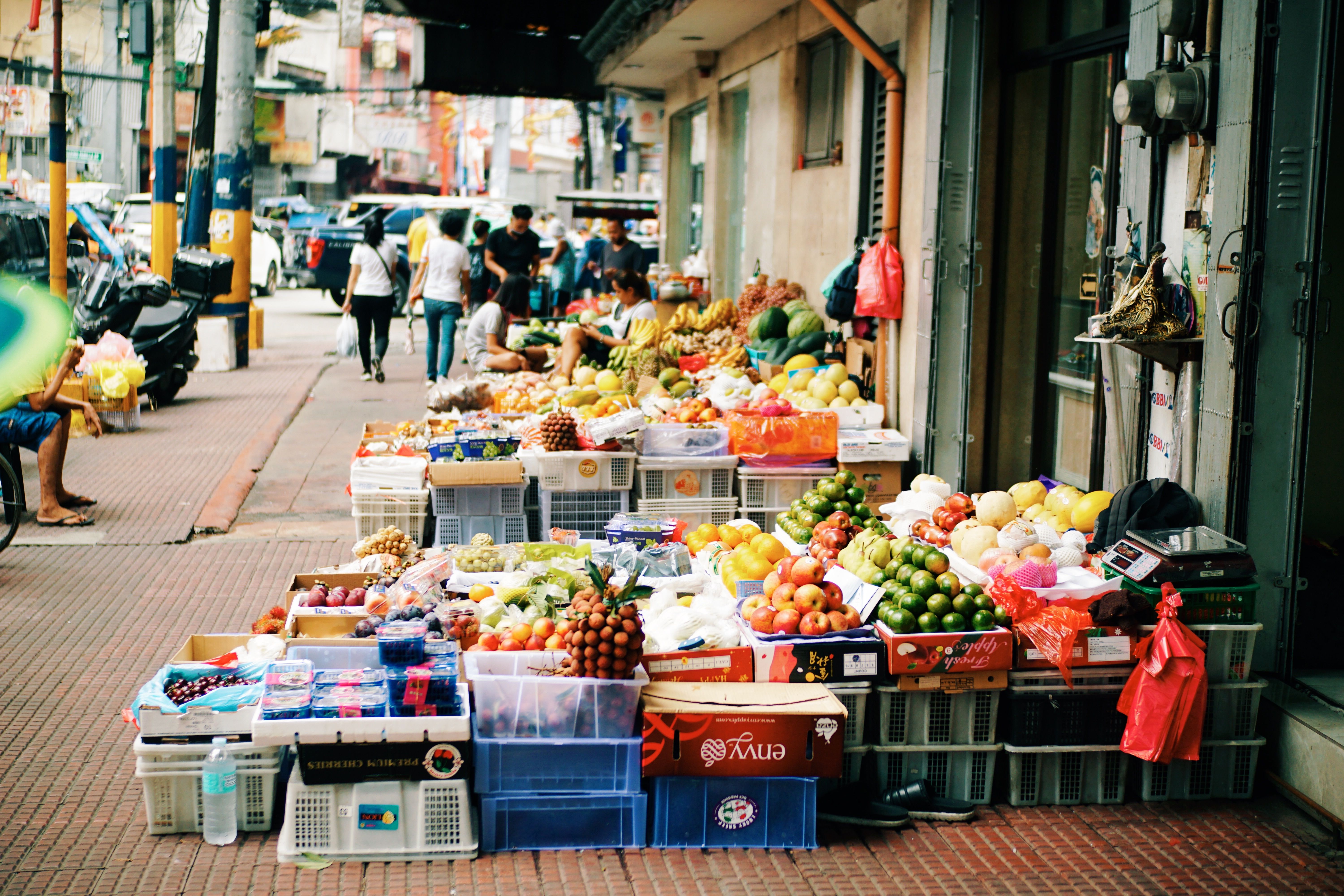 Bustling Street Market in Urban Asian Setting · Free Stock Photo