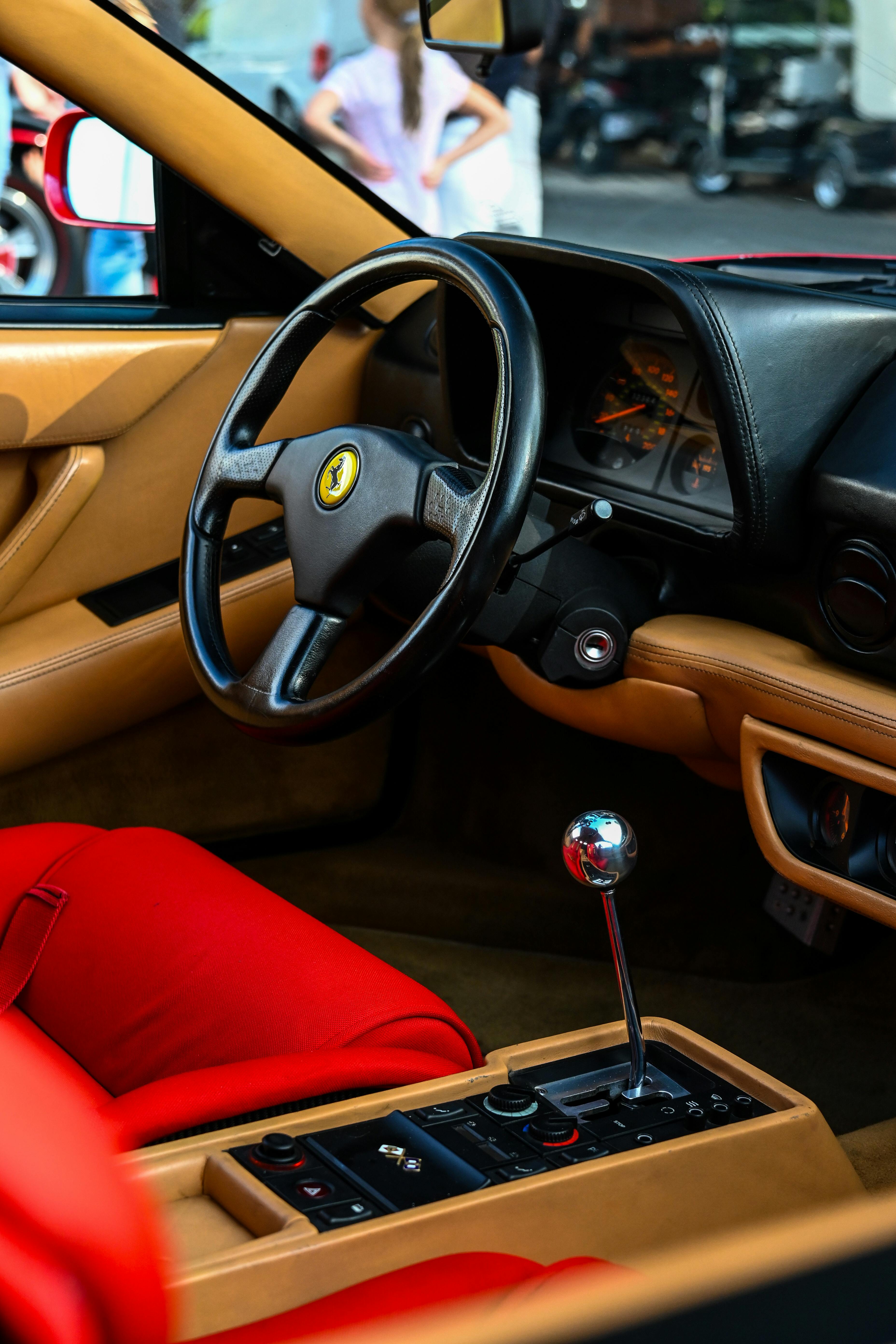 Luxurious Sports Car Interior with Red Upholstery · Free Stock Photo