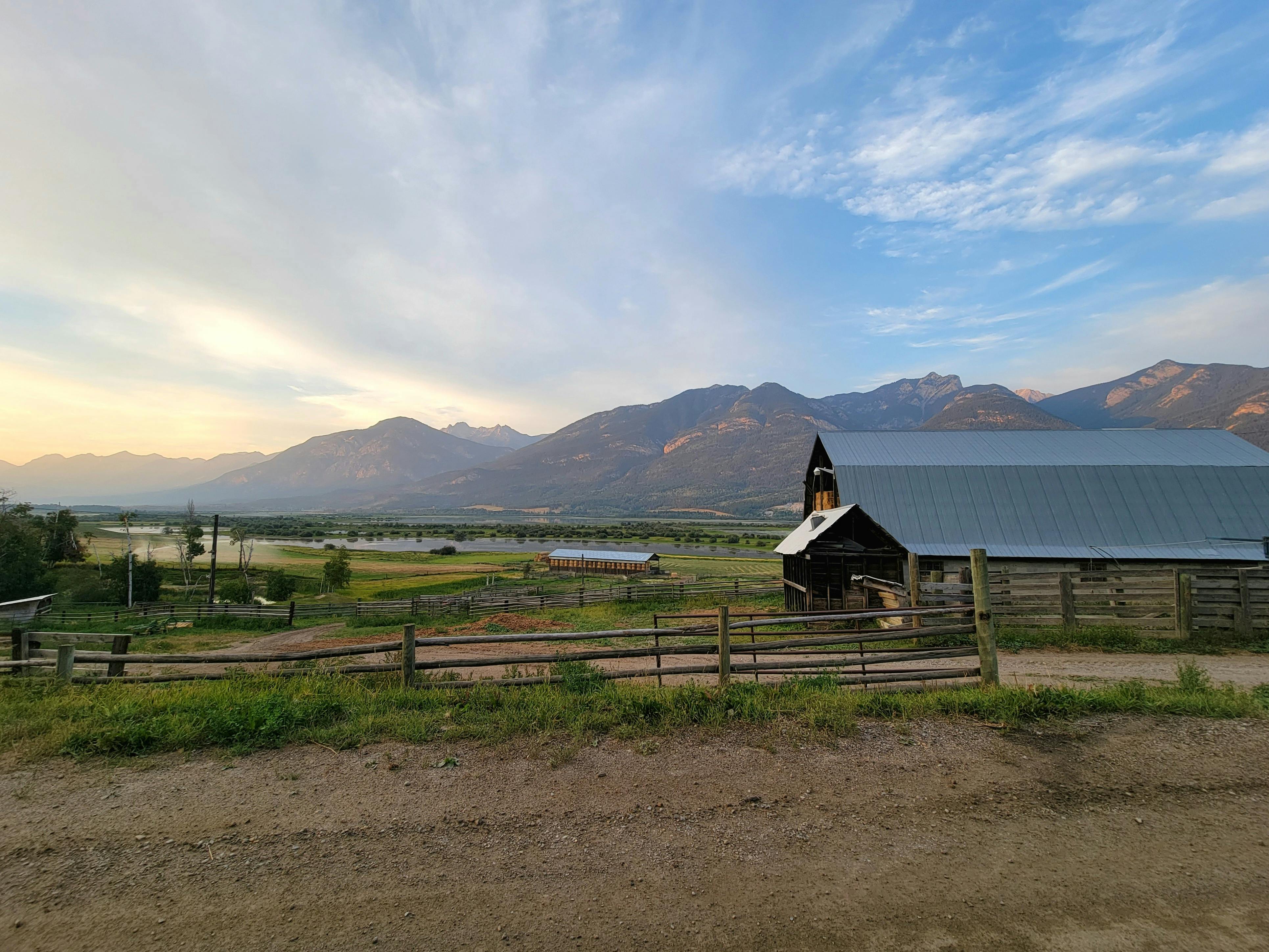 Peaceful Rural Farm Landscape at Sunset · Free Stock Photo