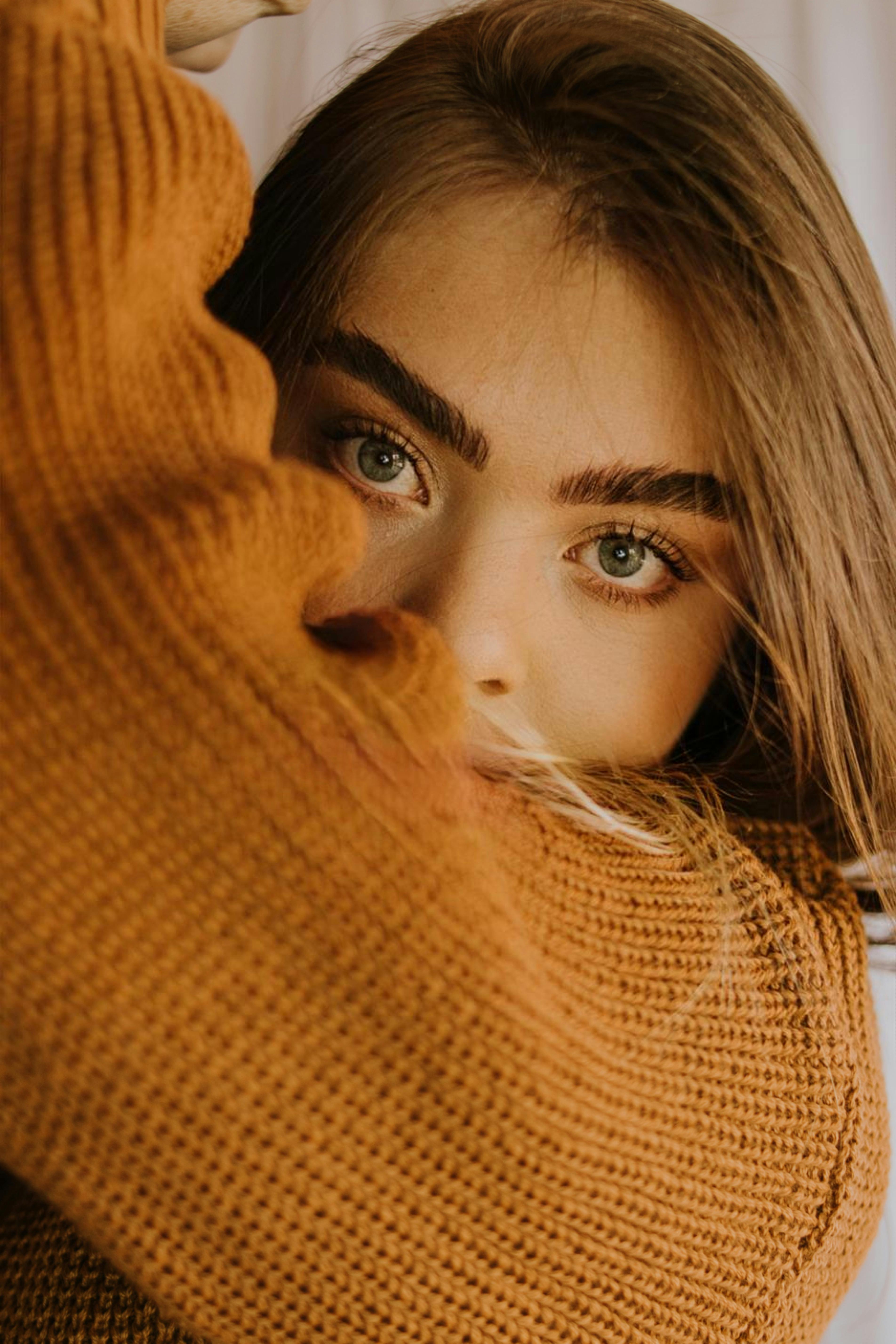 Portrait of Woman in Cozy Sweater Indoors · Free Stock Photo