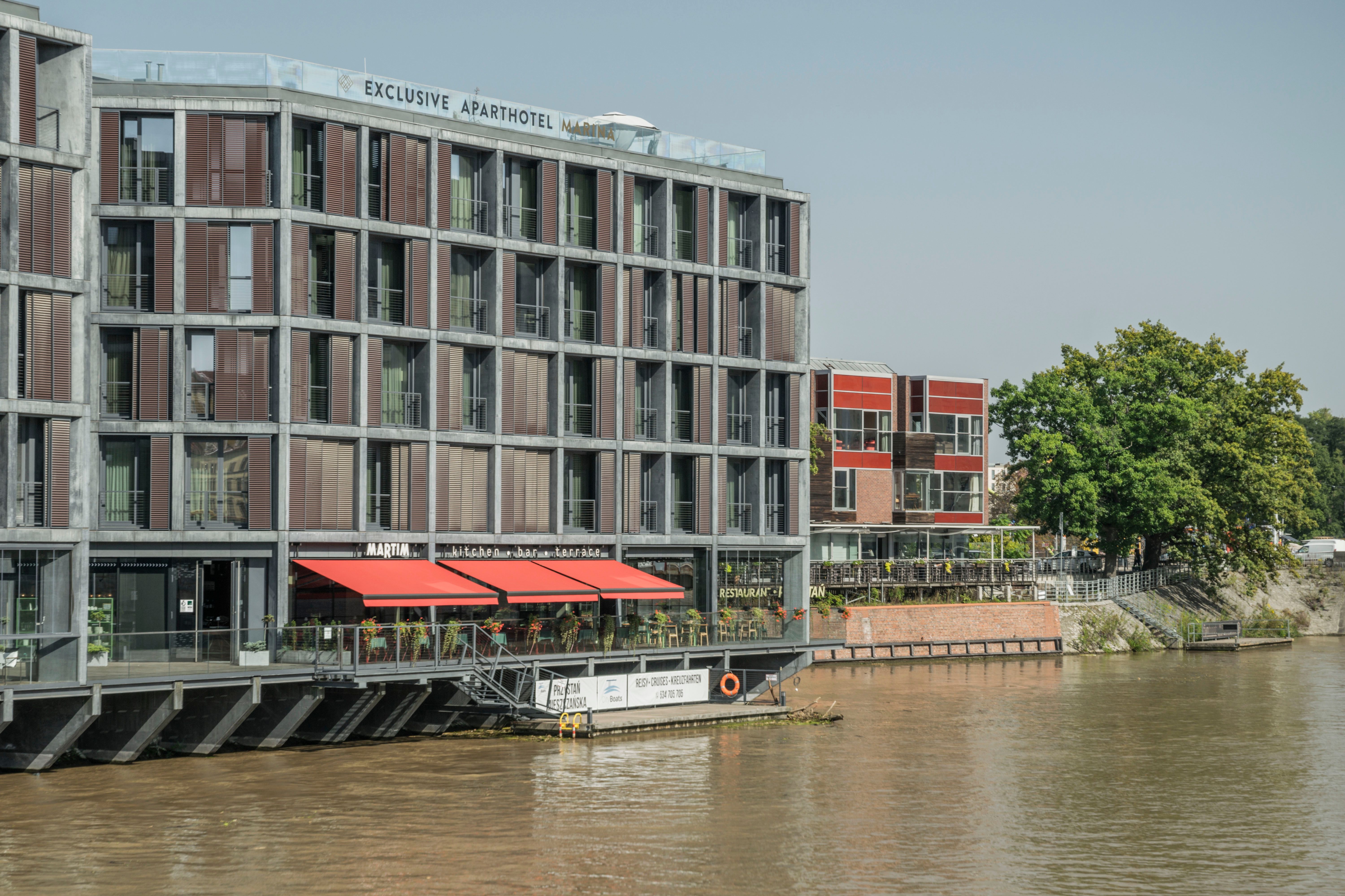 Modern Riverside Architecture in Wrocław · Free Stock Photo