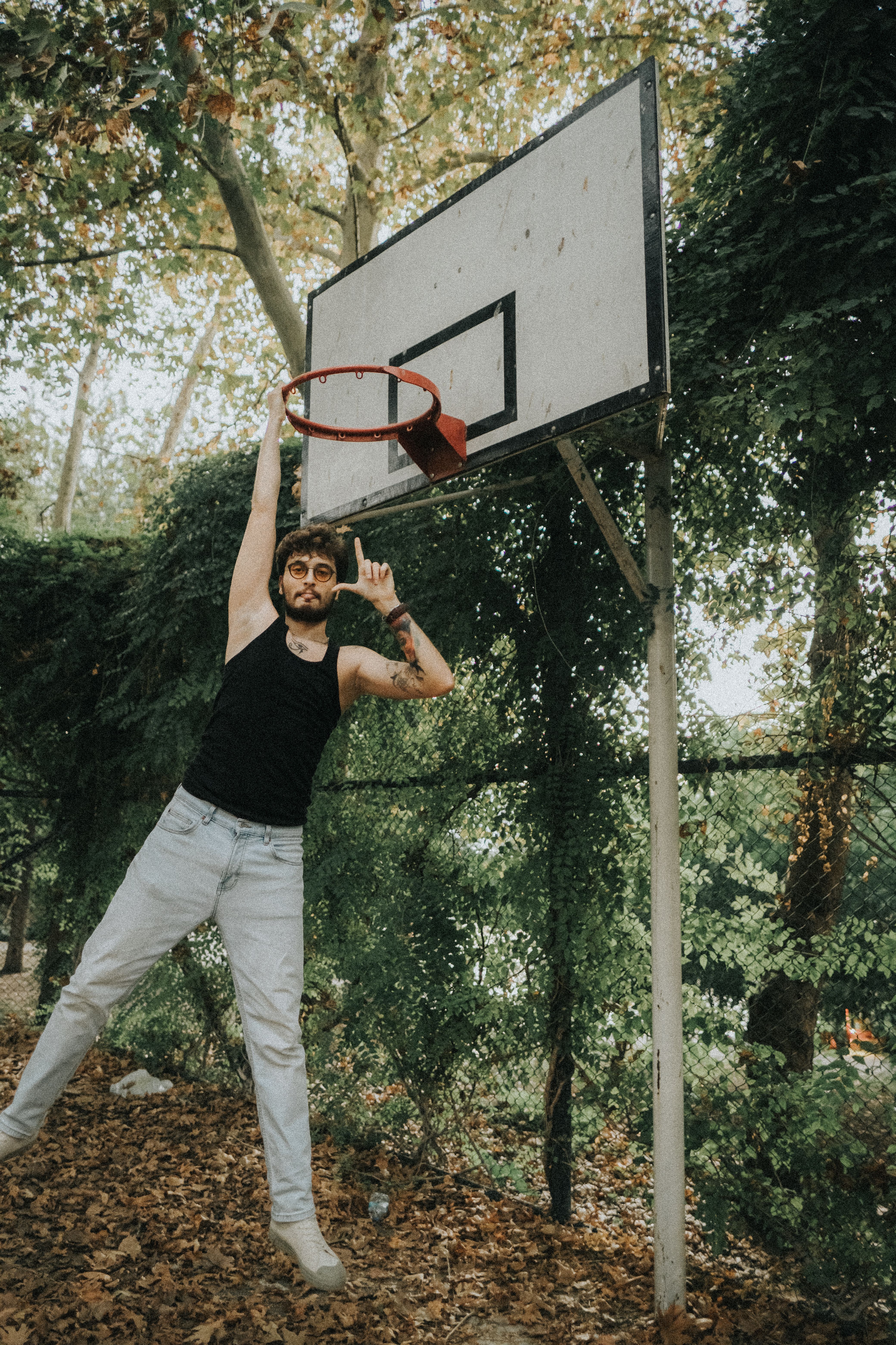 Young Man Dunking a Basketball Outdoors in Antalya · Free Stock Photo
