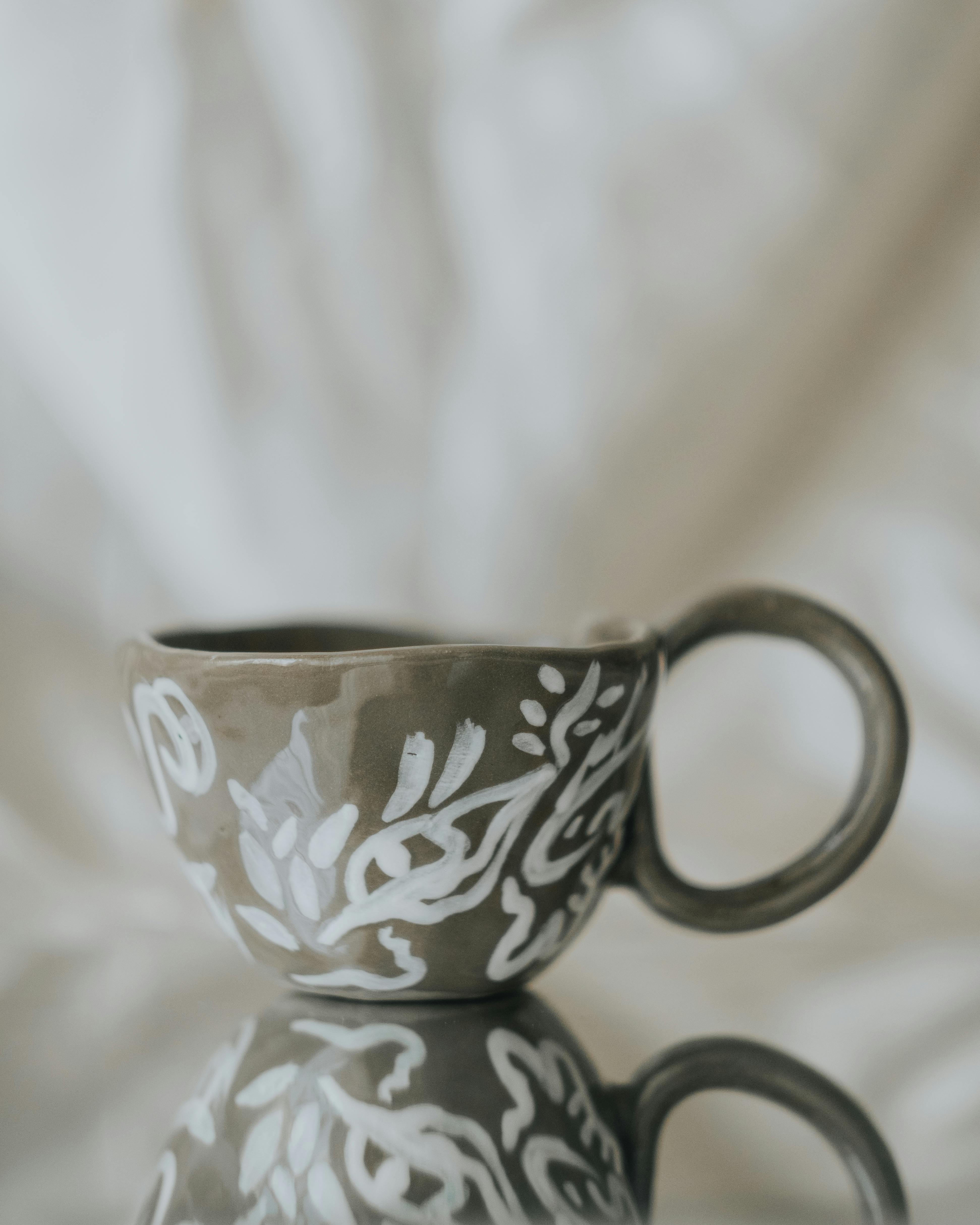 Decorative Ceramic Cup with Artistic Pattern · Free Stock Photo