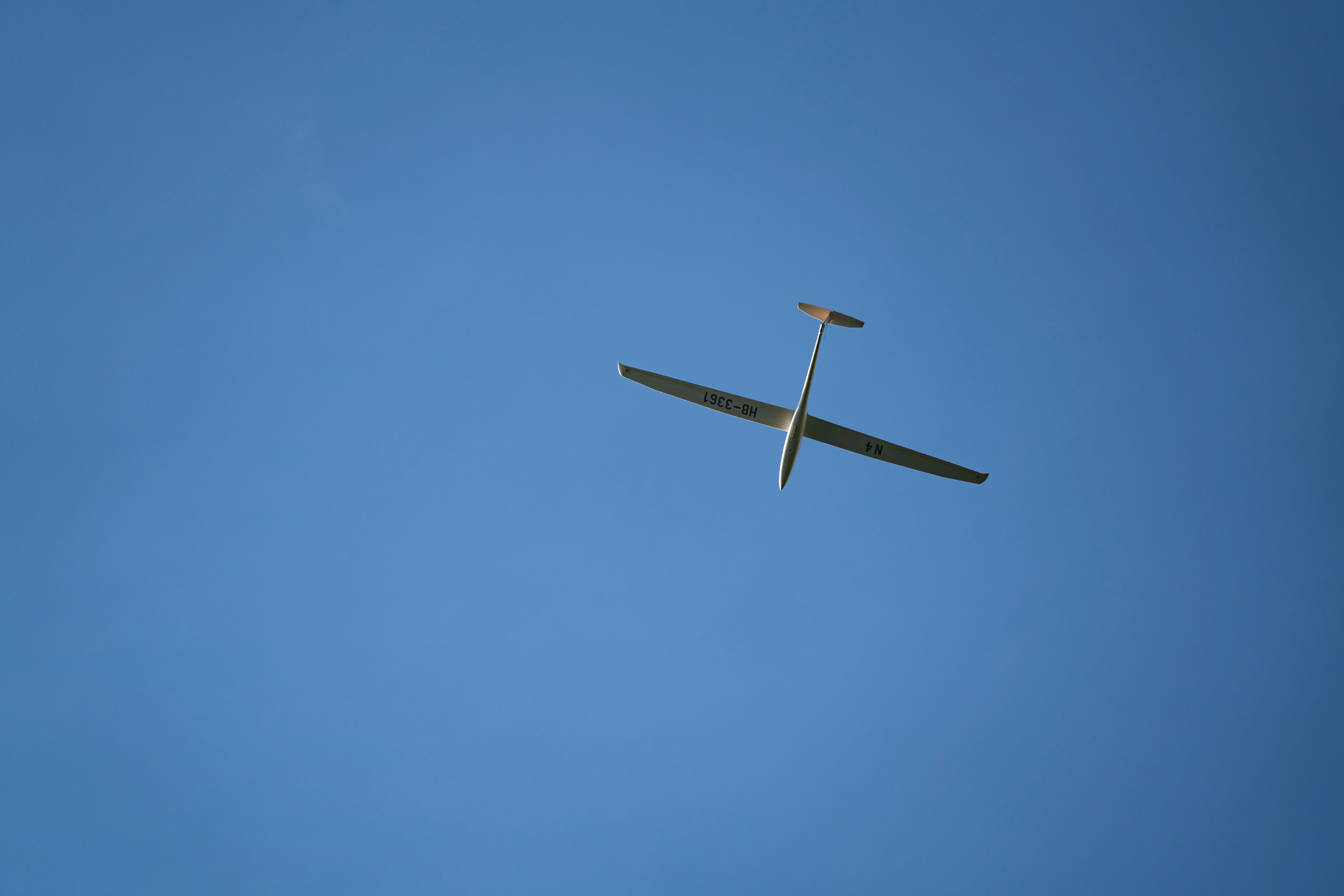 High-Flying Glider in Clear Blue Sky · Free Stock Photo