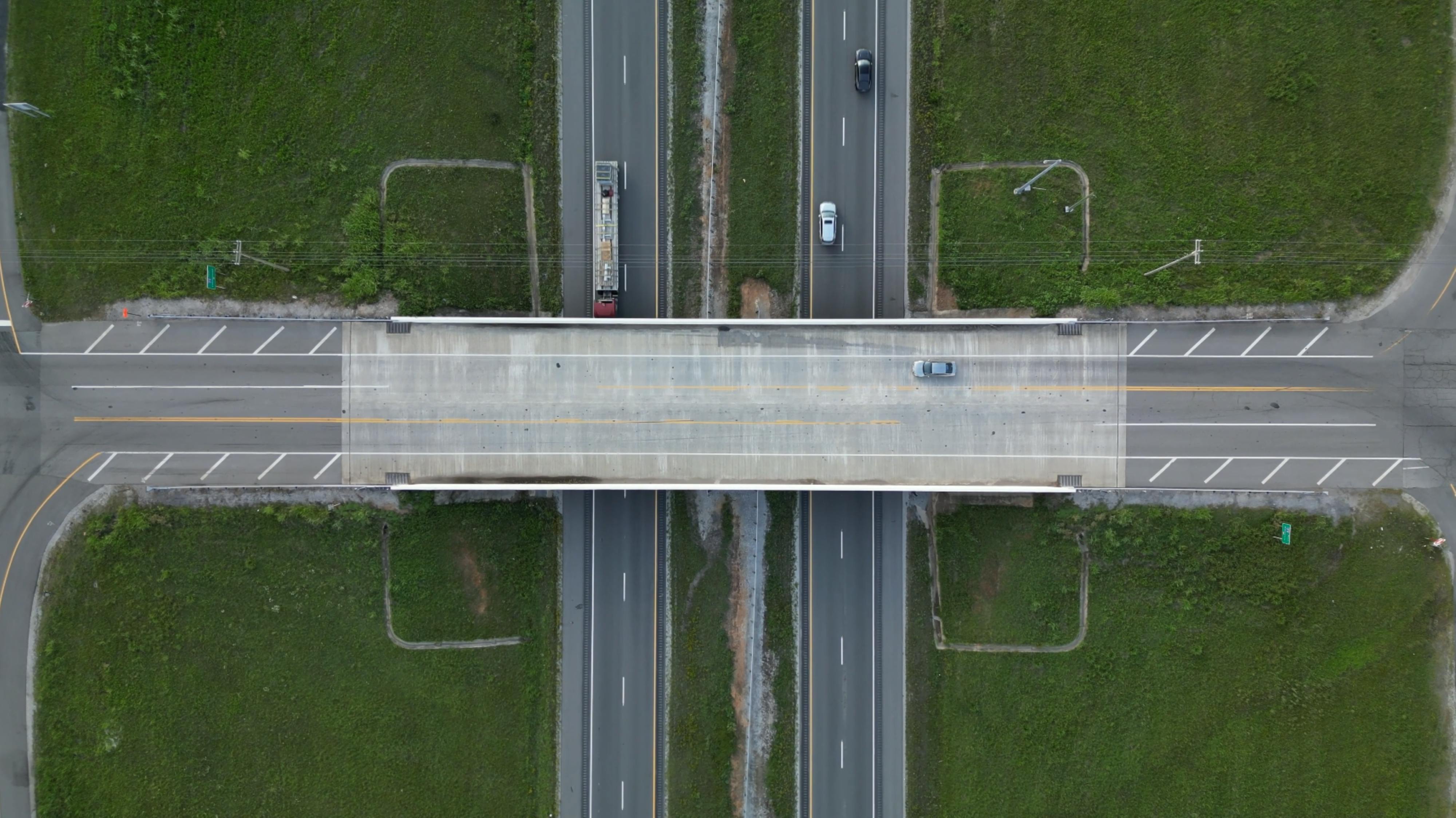 Aerial View of Highway Bridge and Intersection · Free Stock Photo