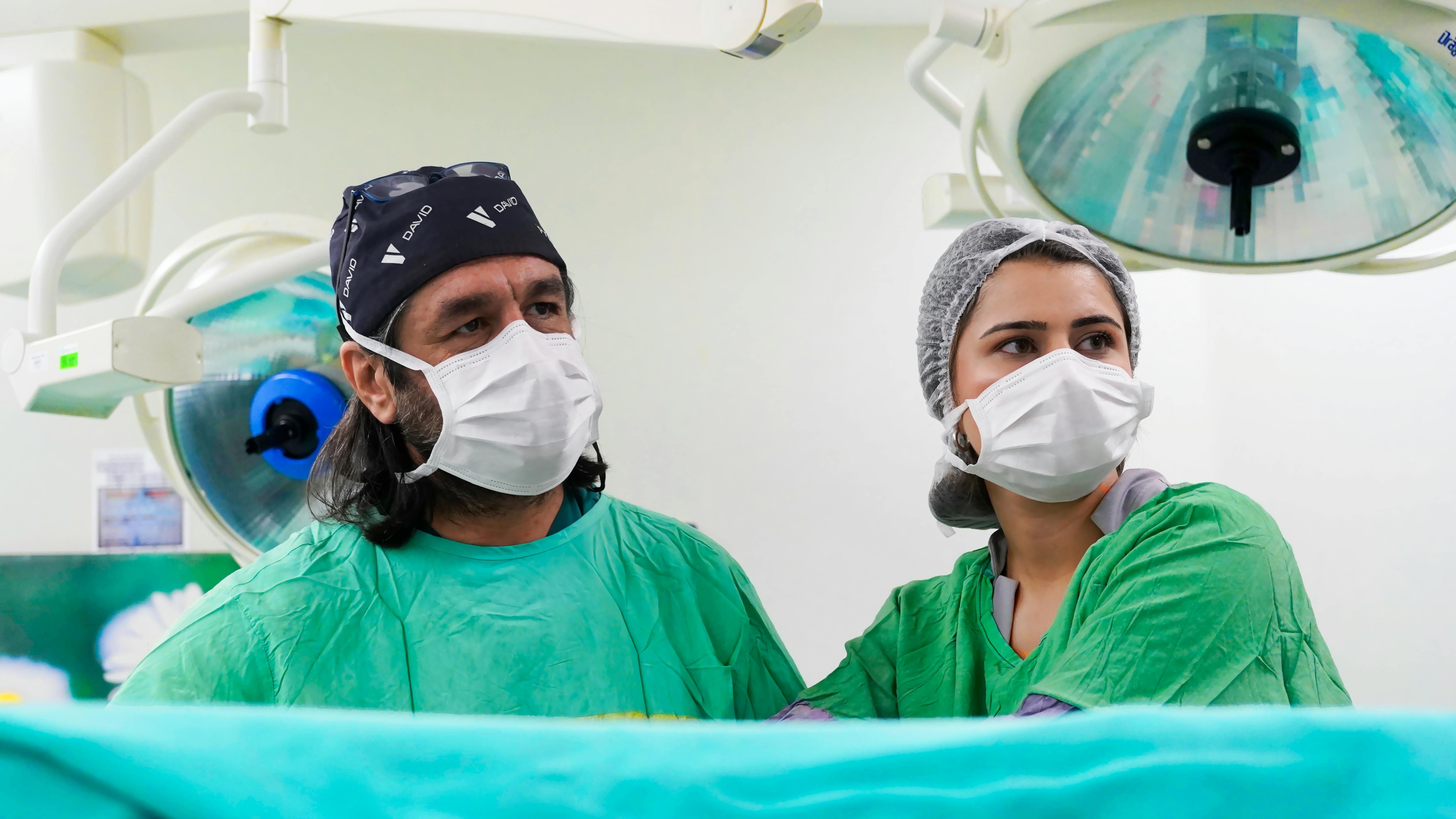 Medical Professionals in Operating Room Setting · Free Stock Photo