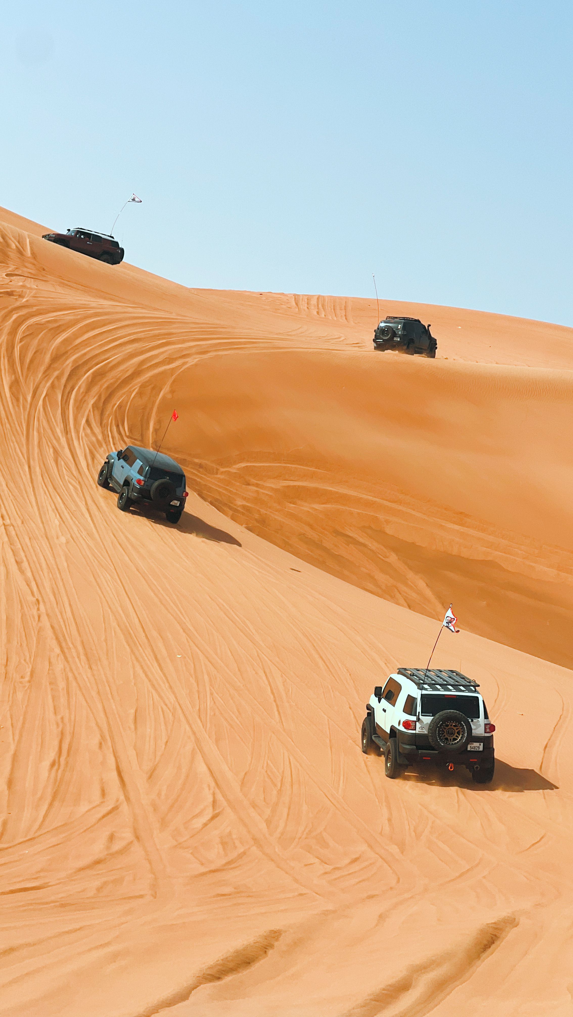 Off-road SUVs Driving on Sharjah Desert Dunes · Free Stock Photo