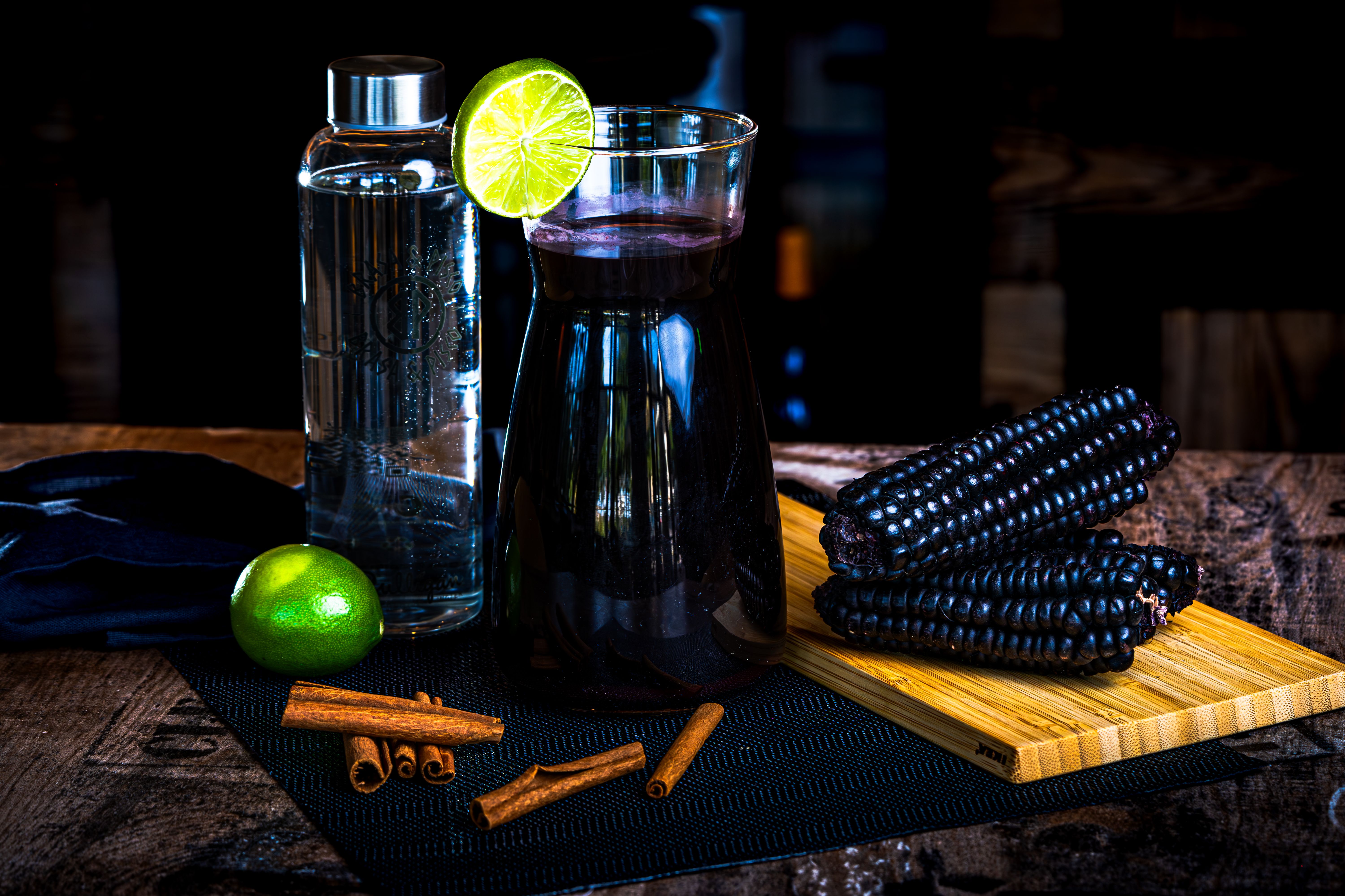 Chicha Morada with Ingredients on Rustic Table · Free Stock Photo