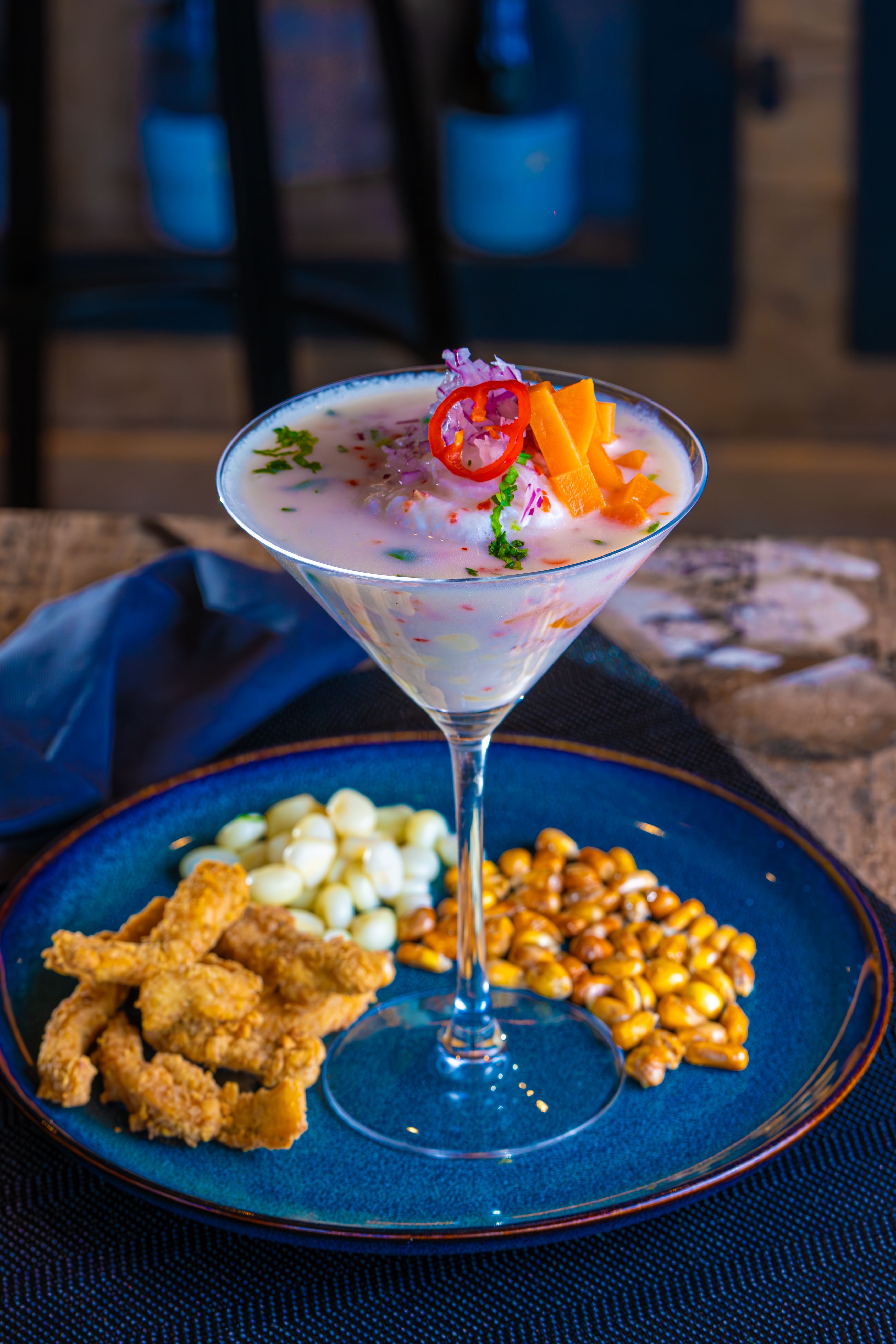 Exquisite Ceviche and Snacks on Elegant Plate · Free Stock Photo