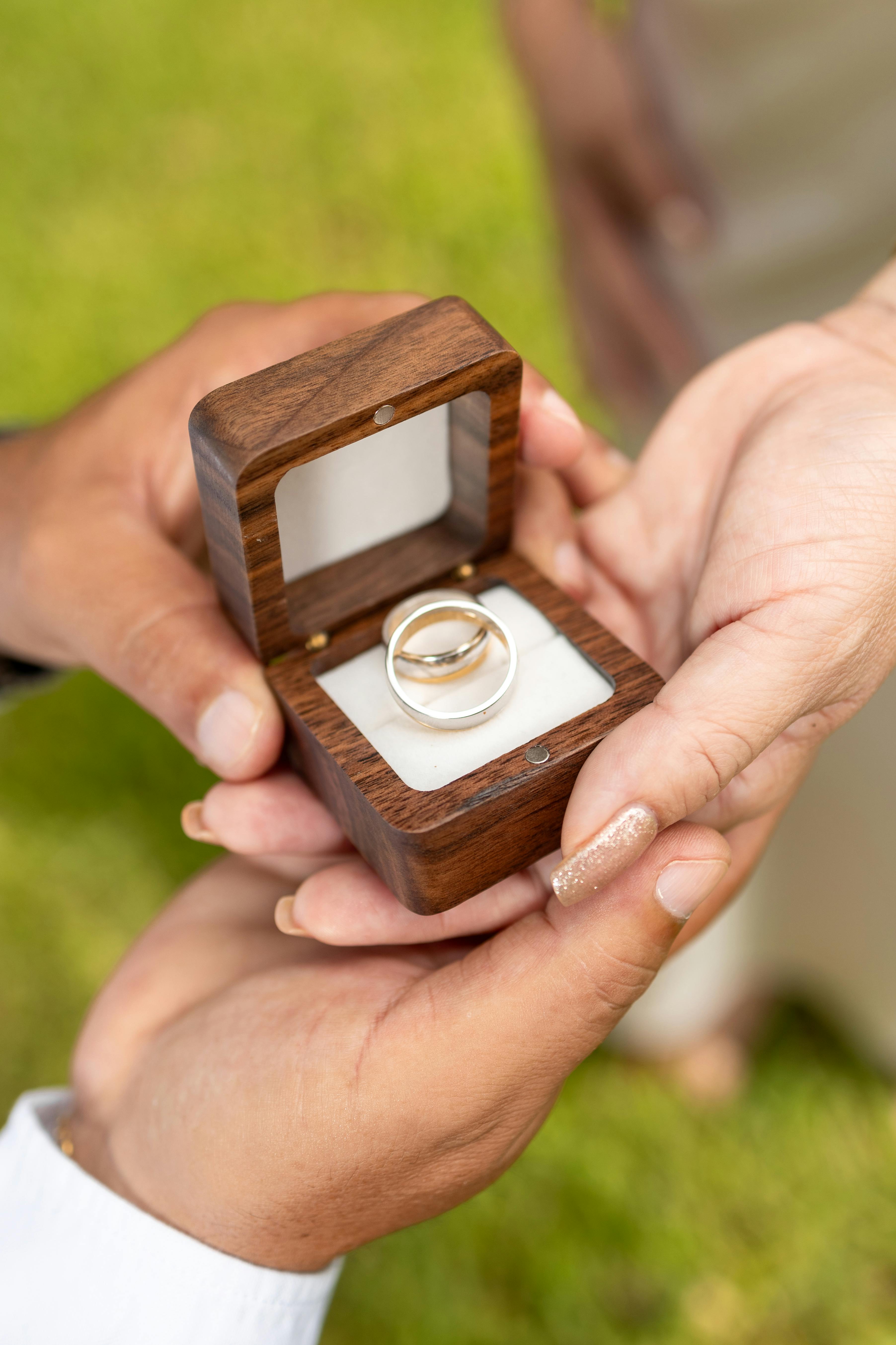 Elegant Engagement Ring Exchange Ceremony Outdoors · Free Stock Photo