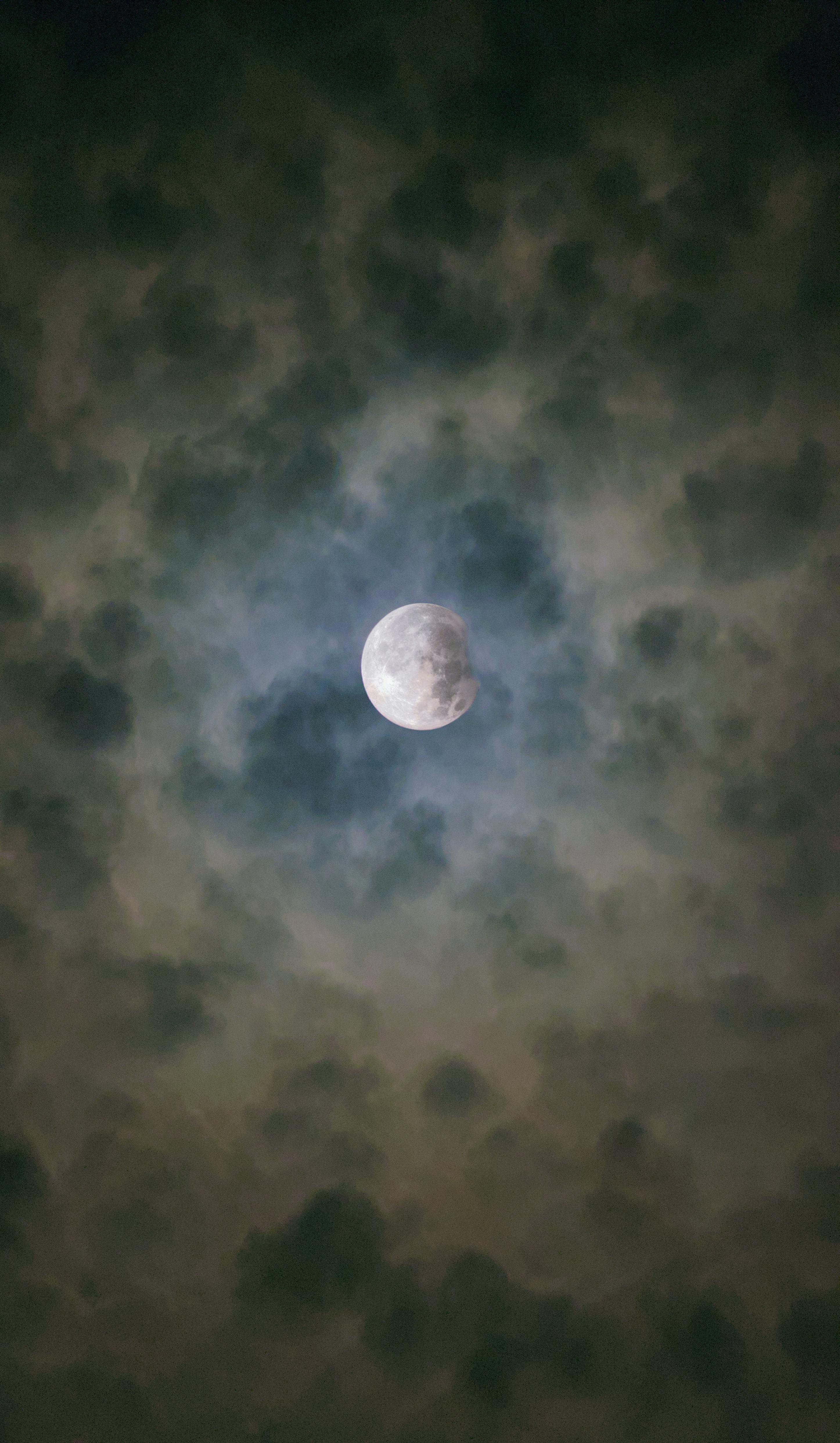 Full Moon Surrounded by Dramatic Clouds at Night · Free Stock Photo