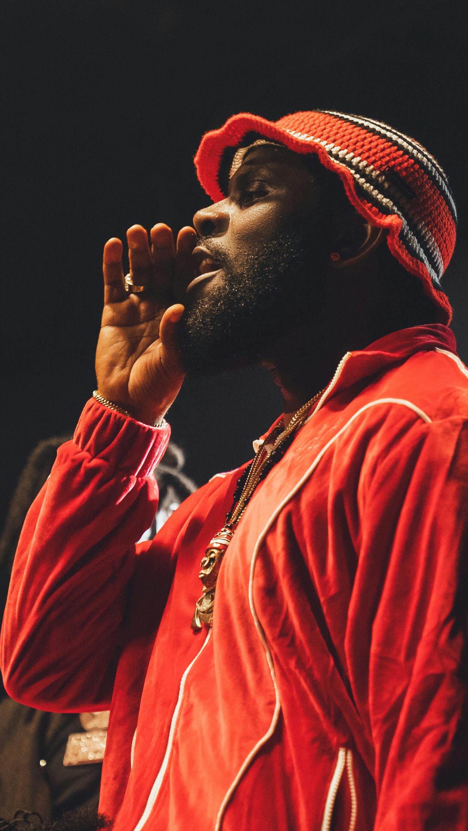 Hip Hop Performer in Vibrant Red Outfit · Free Stock Photo