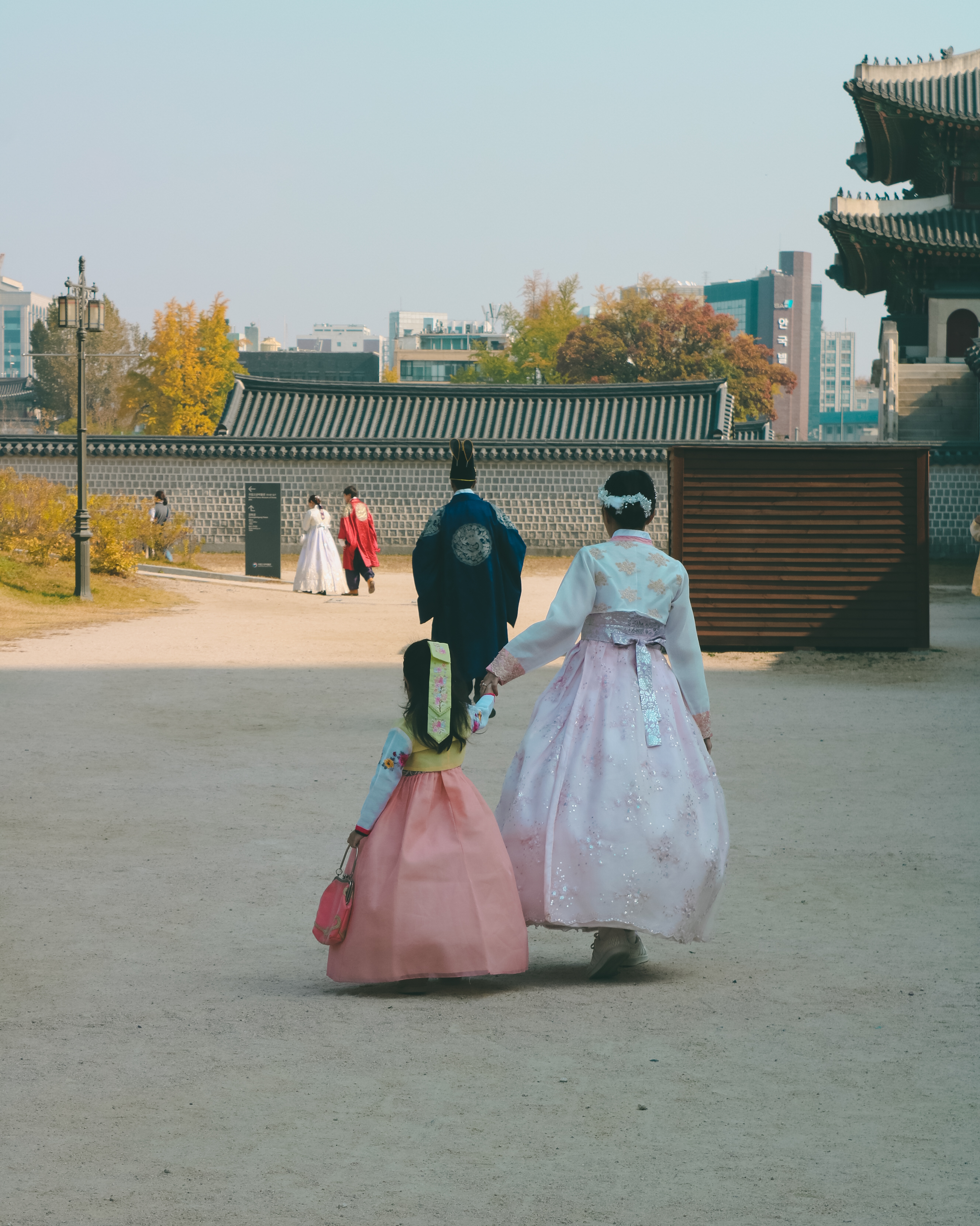 Traditional Korean Hanbok Walk in Autumn Seoul · Free Stock Photo