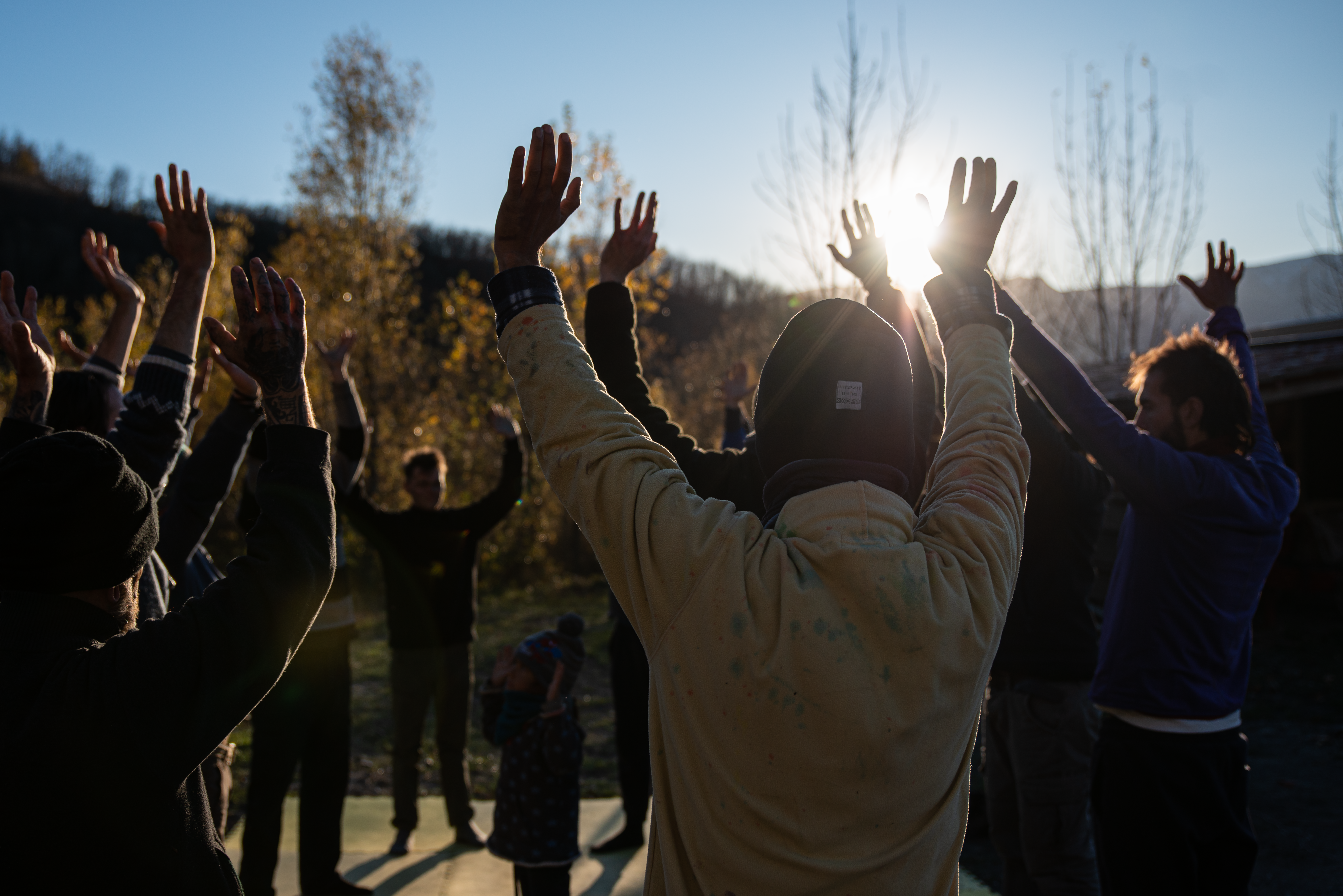 Group of People Enjoying Outdoor Morning Exercise · Free Stock Photo