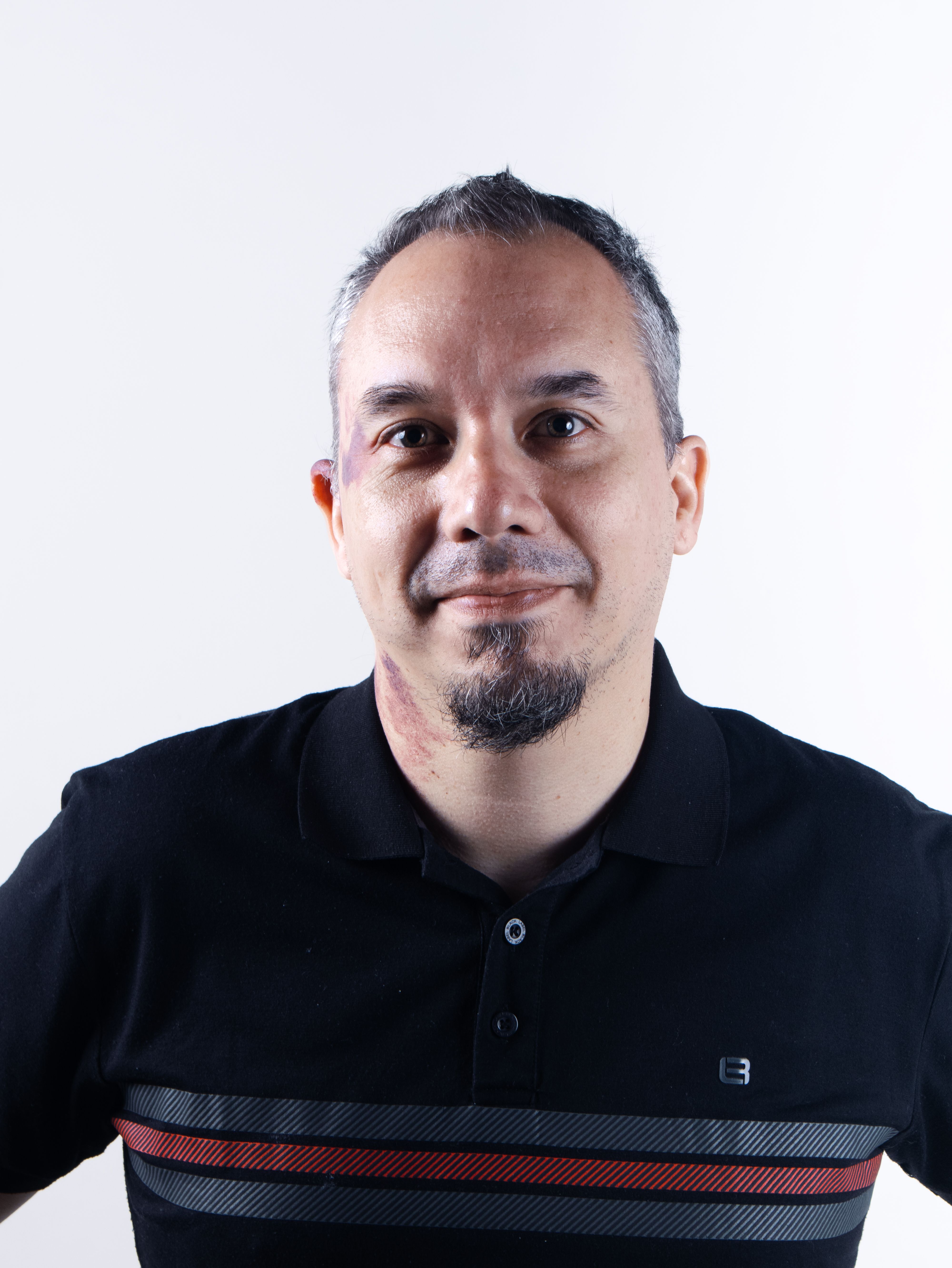 Portrait of a Man with a Black Polo Shirt · Free Stock Photo