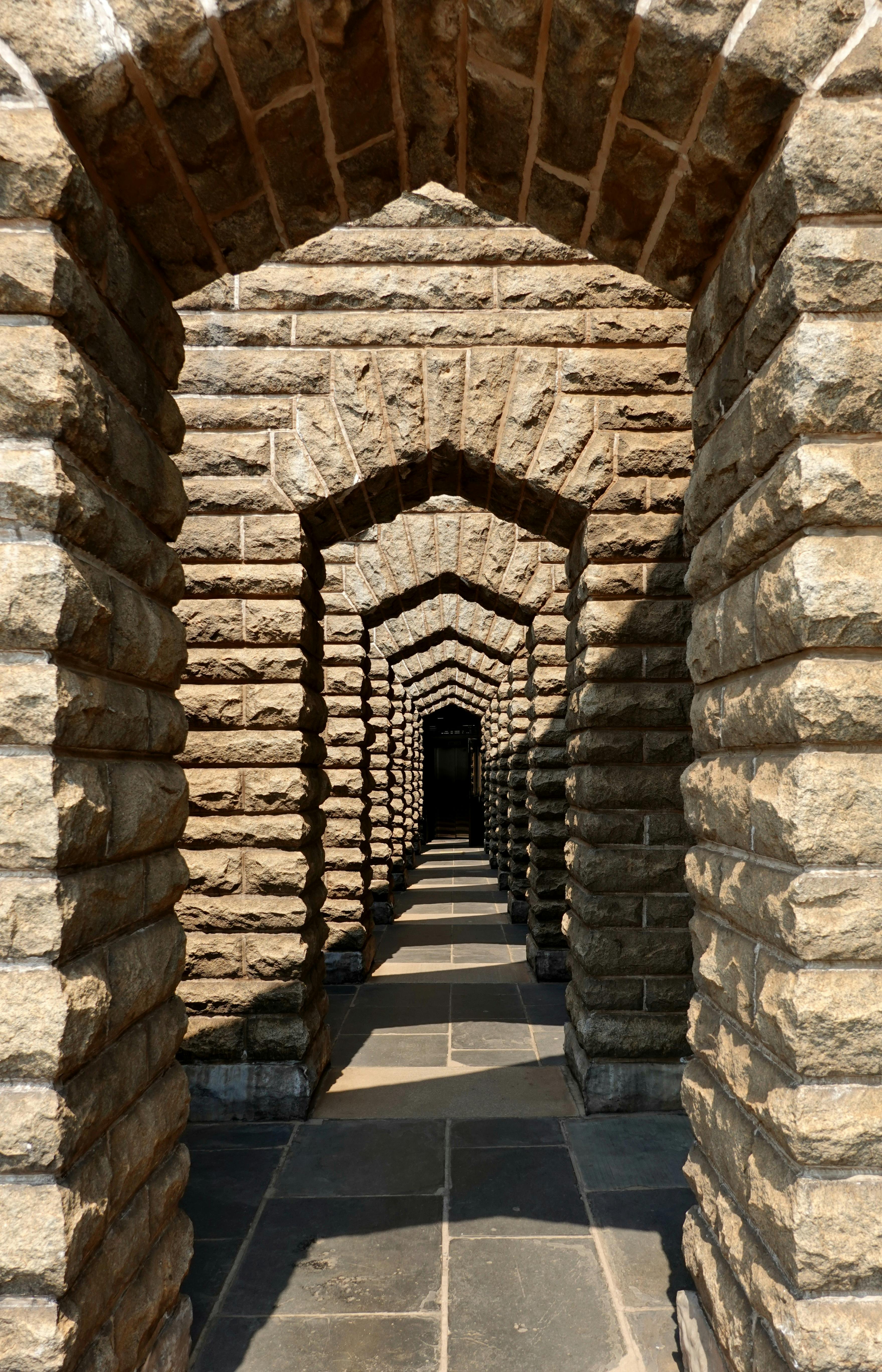 Architectural Stone Corridor at Voortrekker Monument · Free Stock Photo