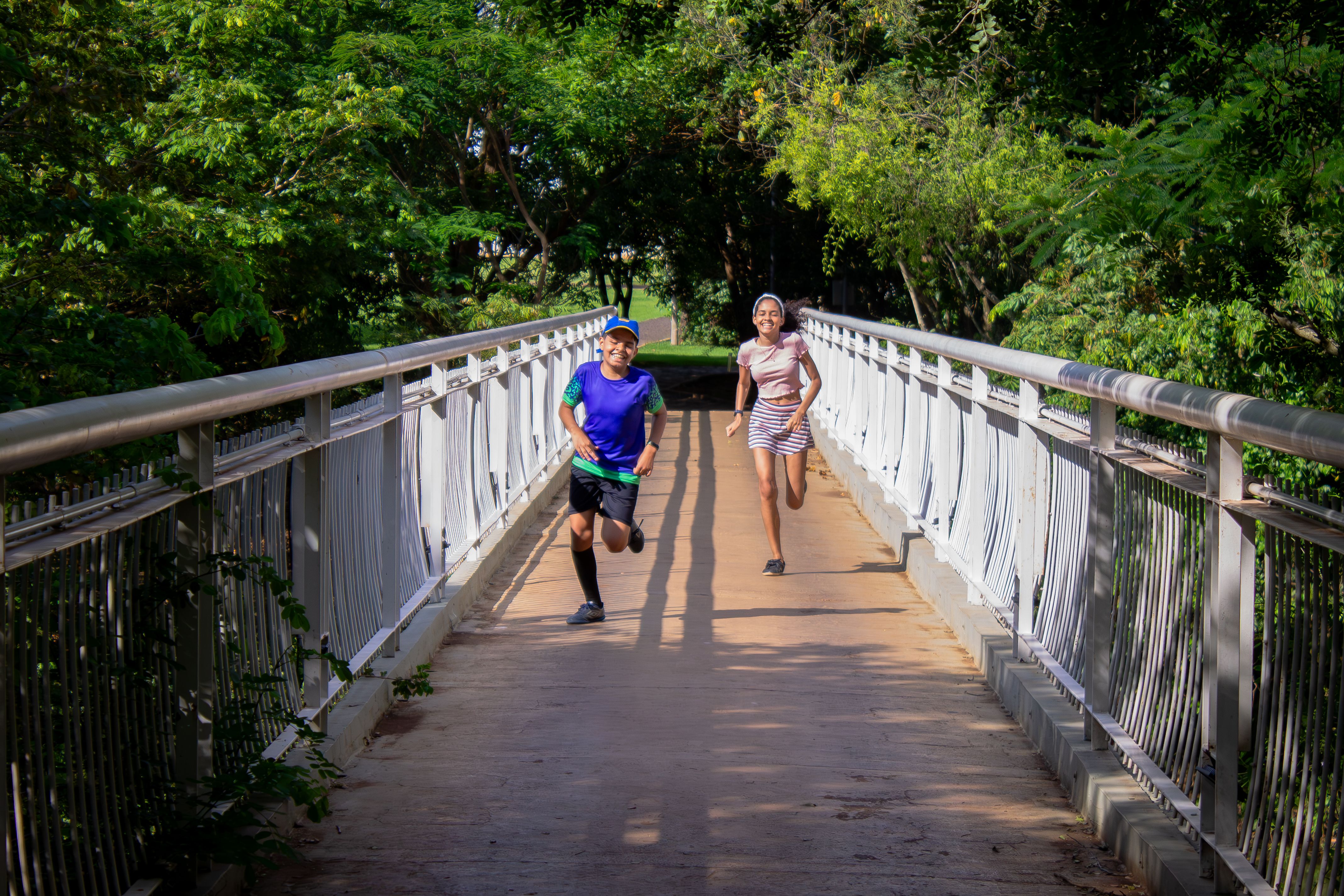 Children Running on a Bridge Outdoors in Summer · Free Stock Photo
