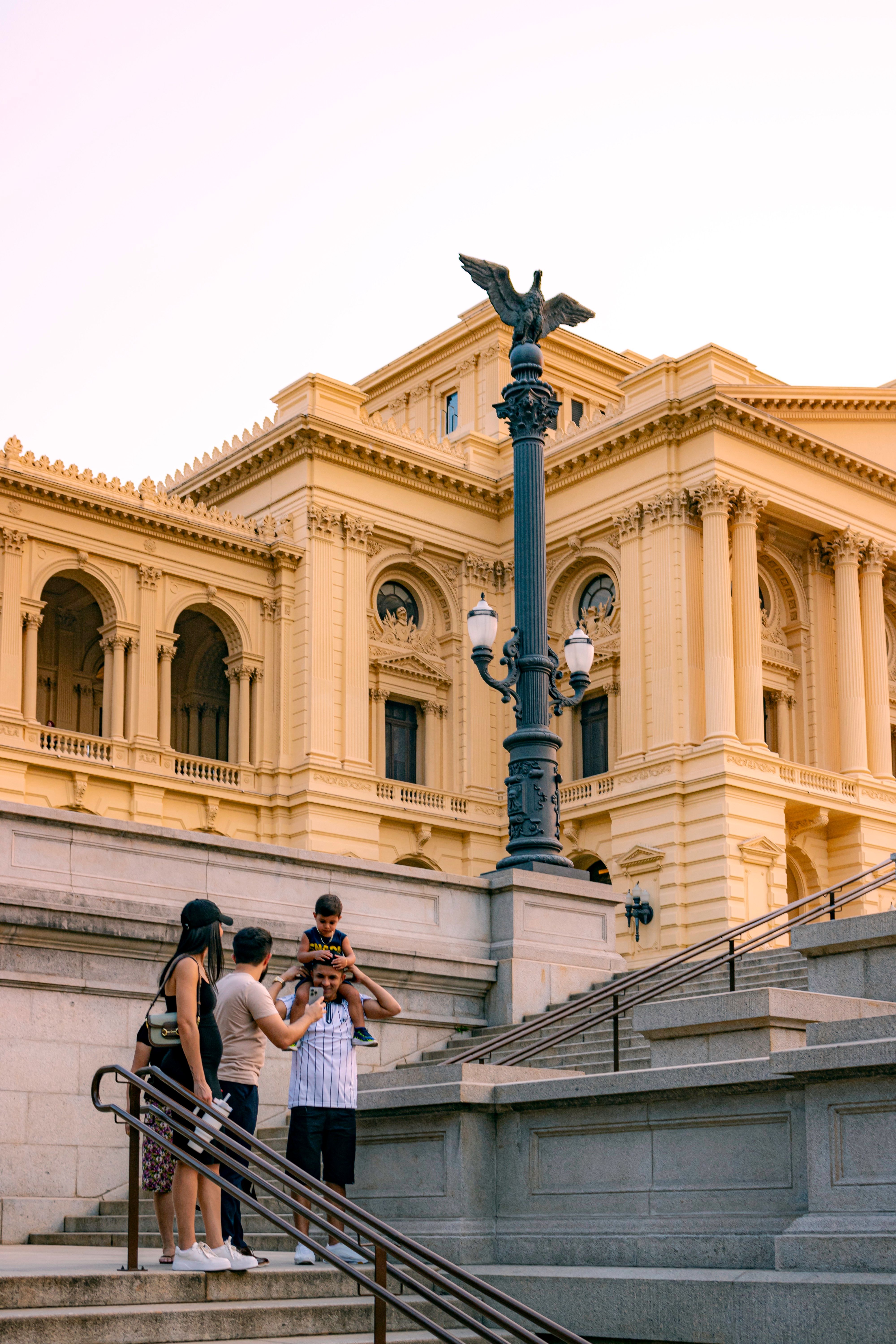 Family Enjoying Day at Historical Building · Free Stock Photo