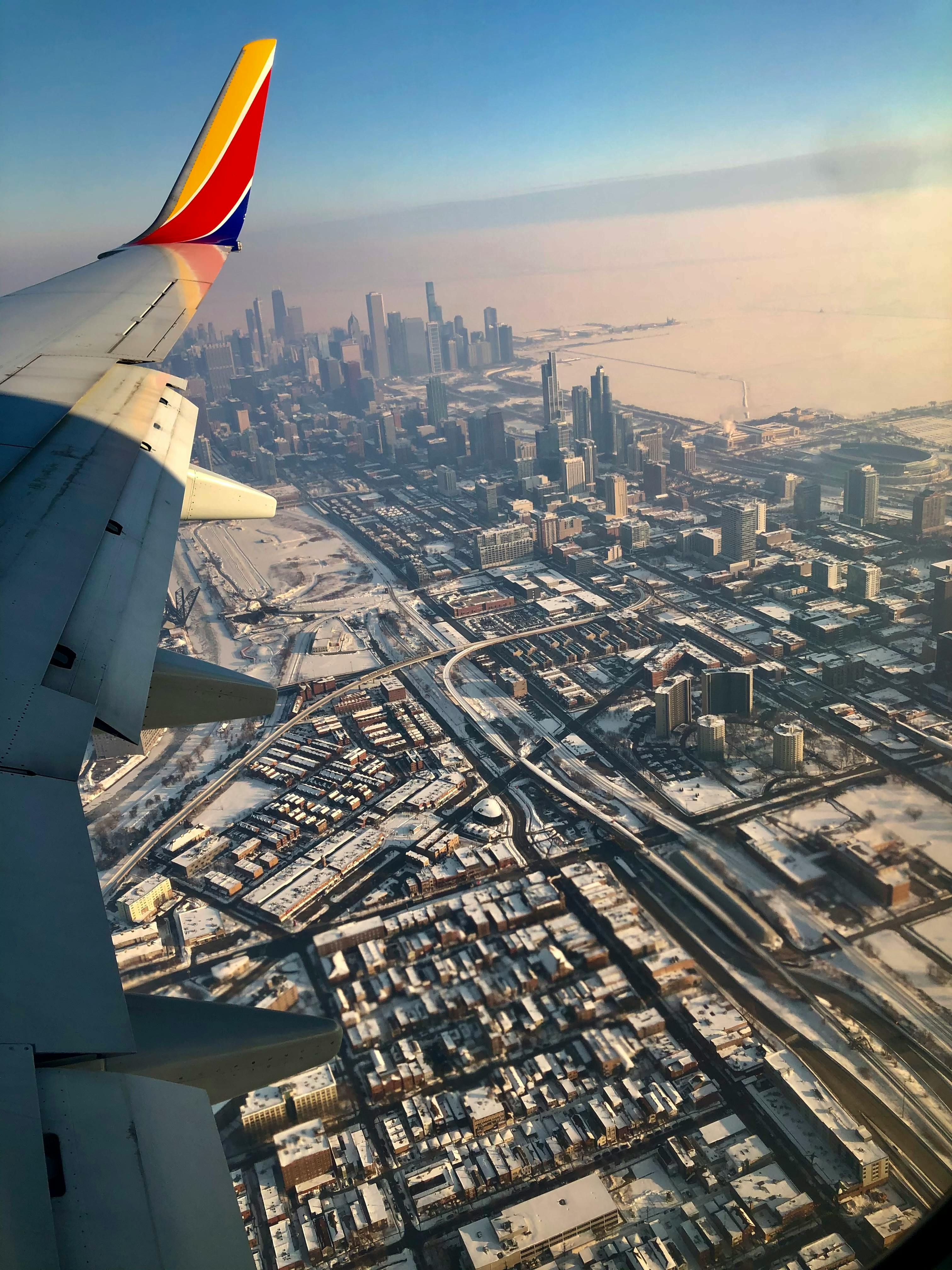 Aerial View of Snowy Chicago Skyline from Airplane · Free Stock Photo