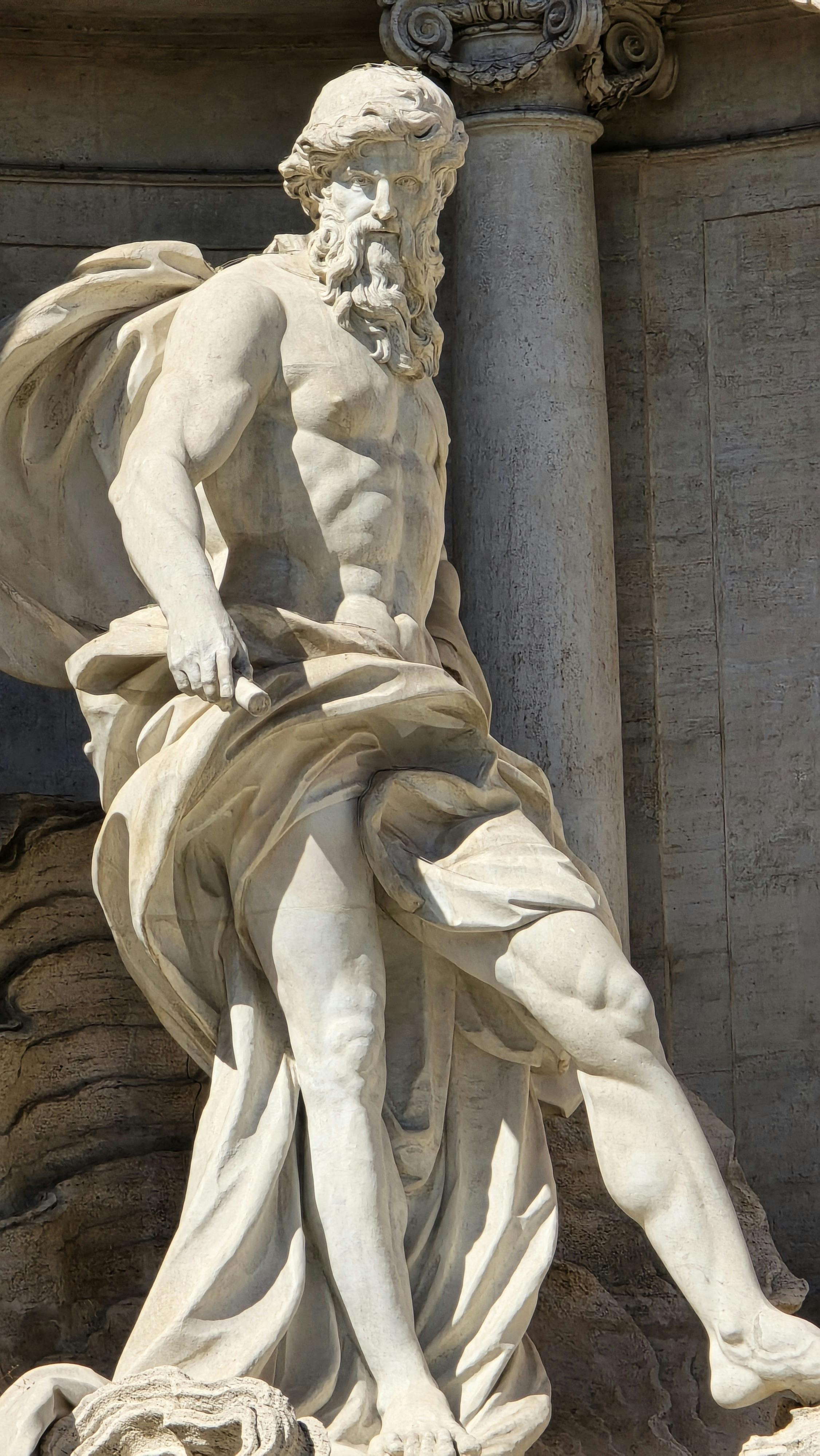 Statue of Roman God in Classical Pose · Free Stock Photo