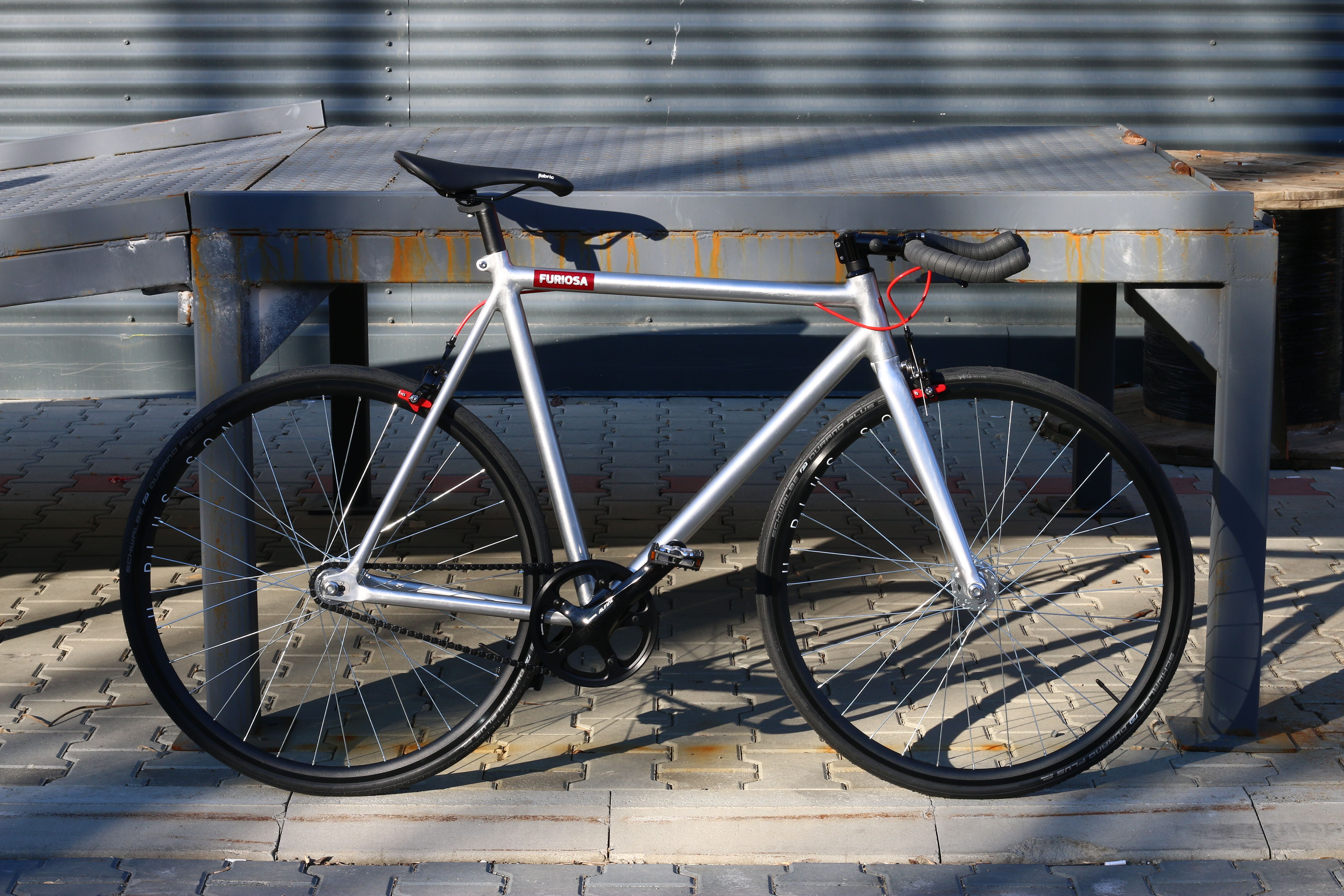Sleek Silver Road Bicycle with Modern Design · Free Stock Photo