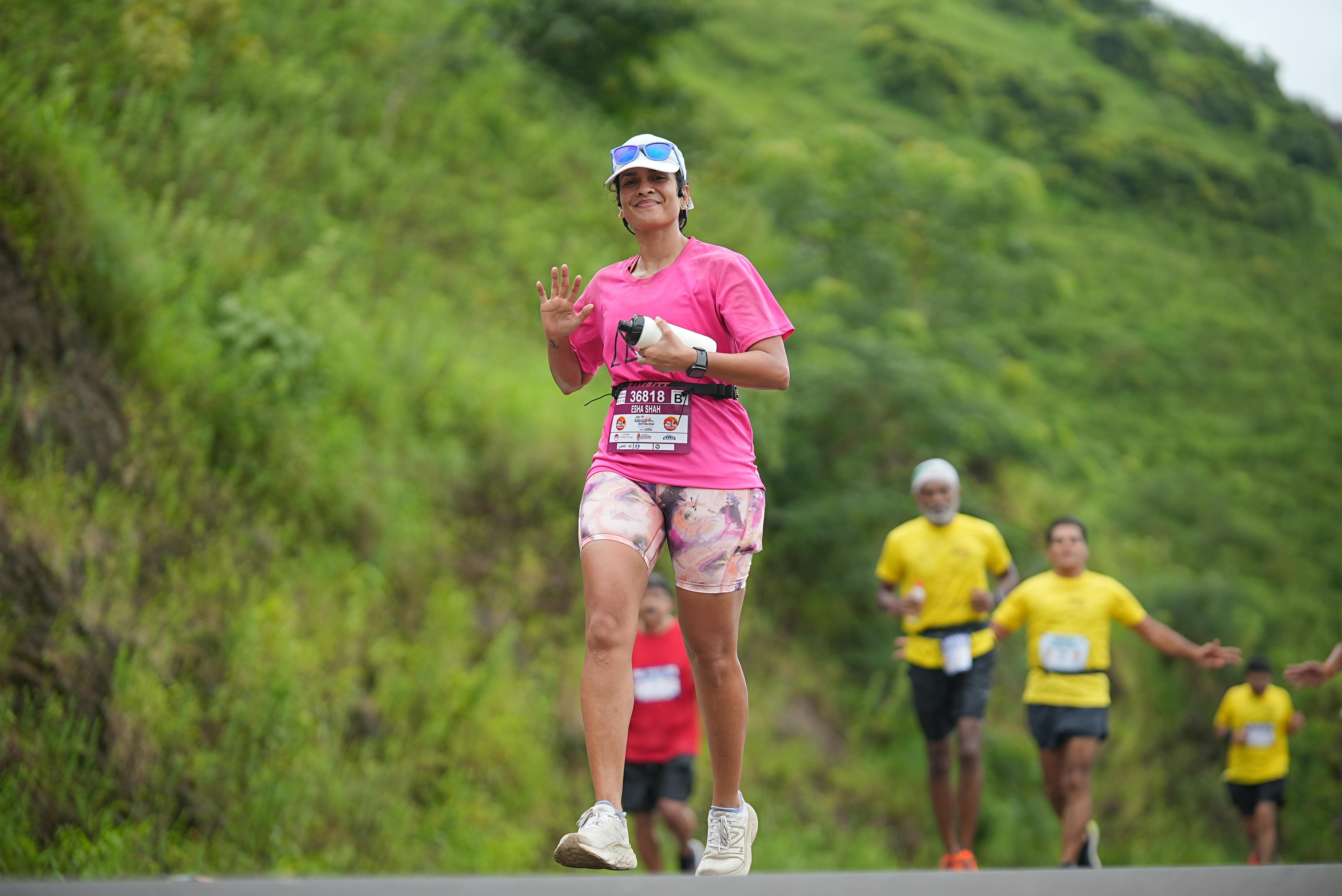 Woman Running Marathon Enjoying Outdoor Race · Free Stock Photo
