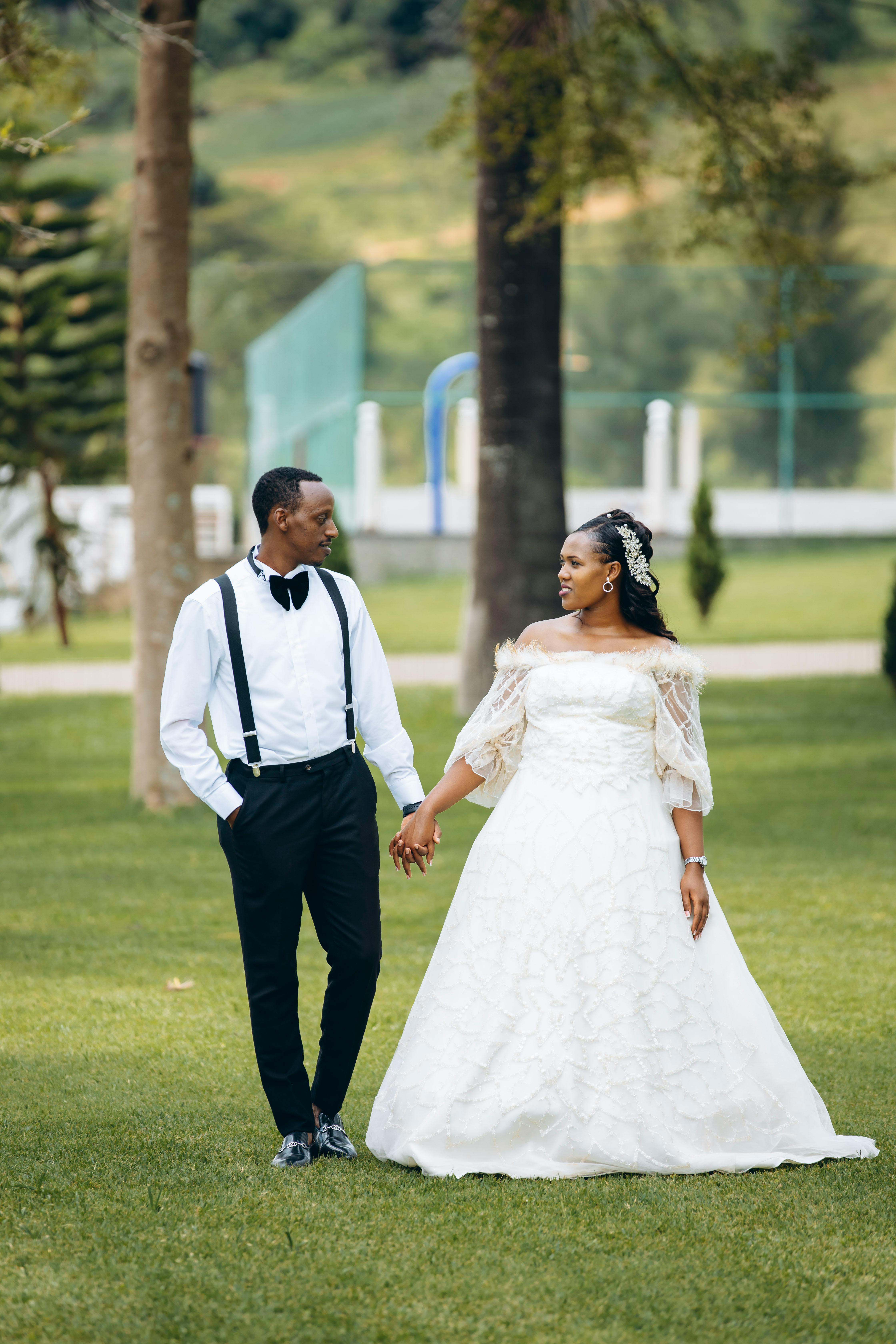 Elegant Outdoor Wedding Couple in Formal Attire · Free Stock Photo