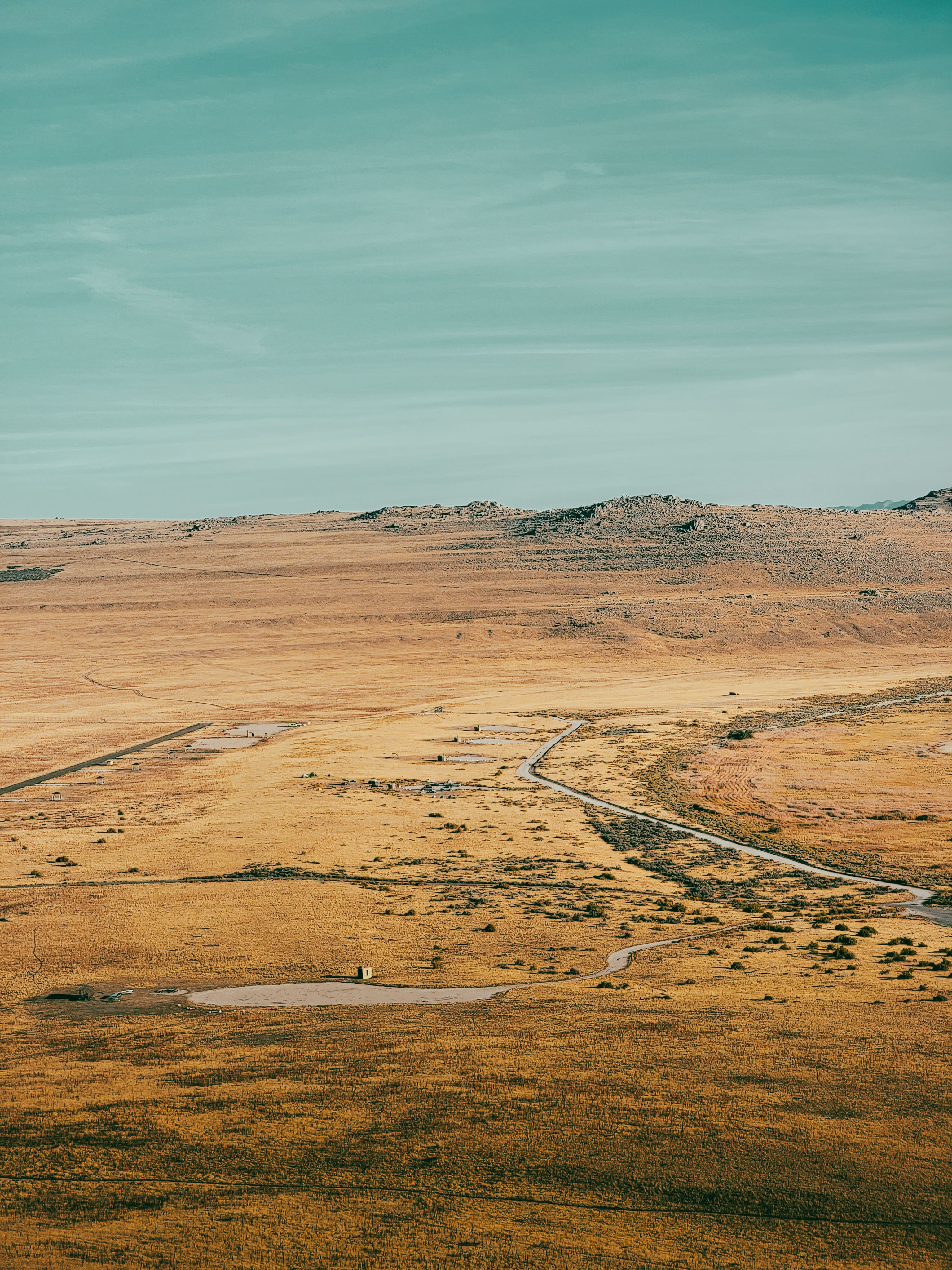Wide Open Plains Under Serene Sky · Free Stock Photo