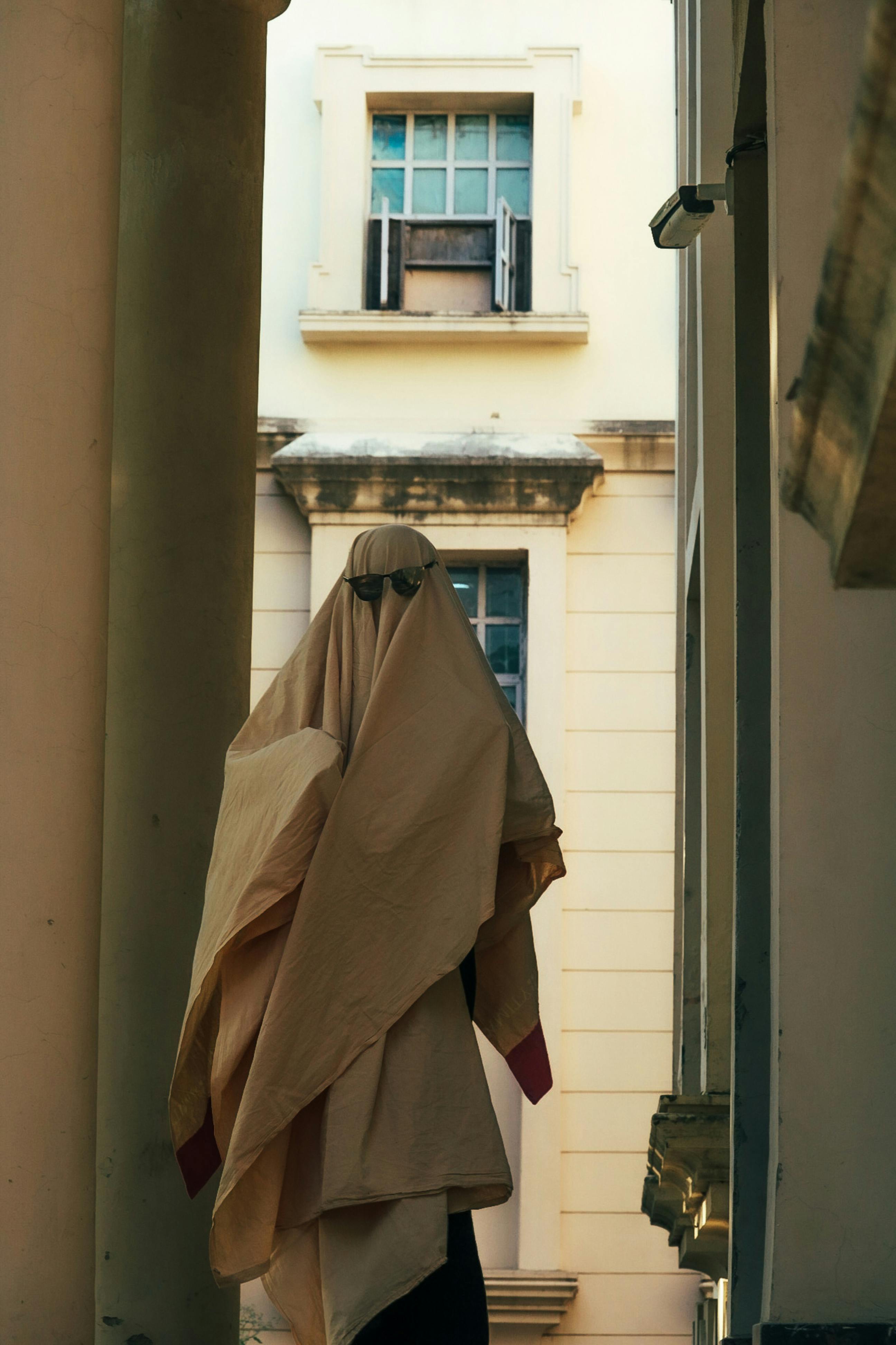 Eerie Ghost-Like Figure in Urban Setting · Free Stock Photo