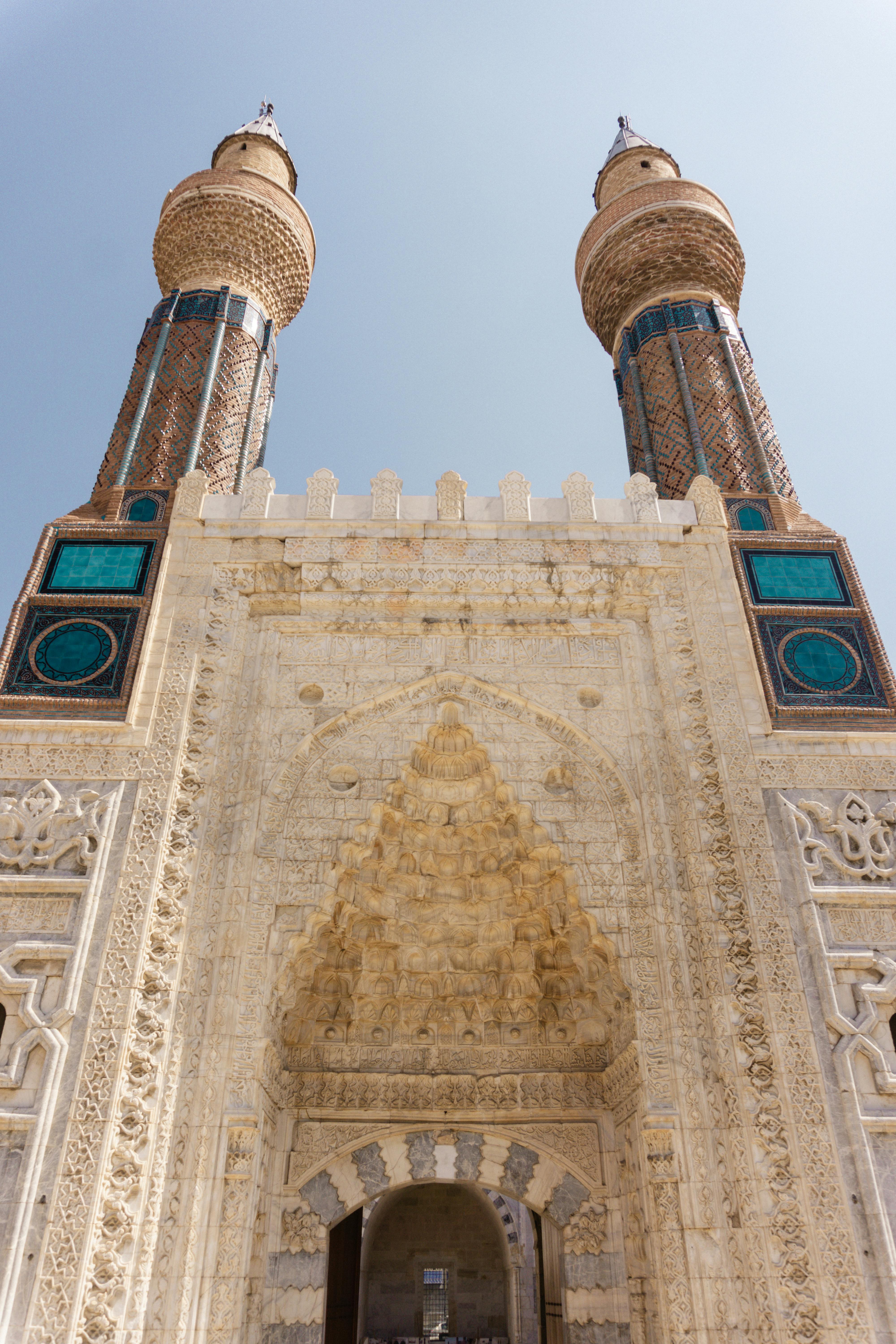 Intricate Mosque Entrance with Twin Minarets · Free Stock Photo