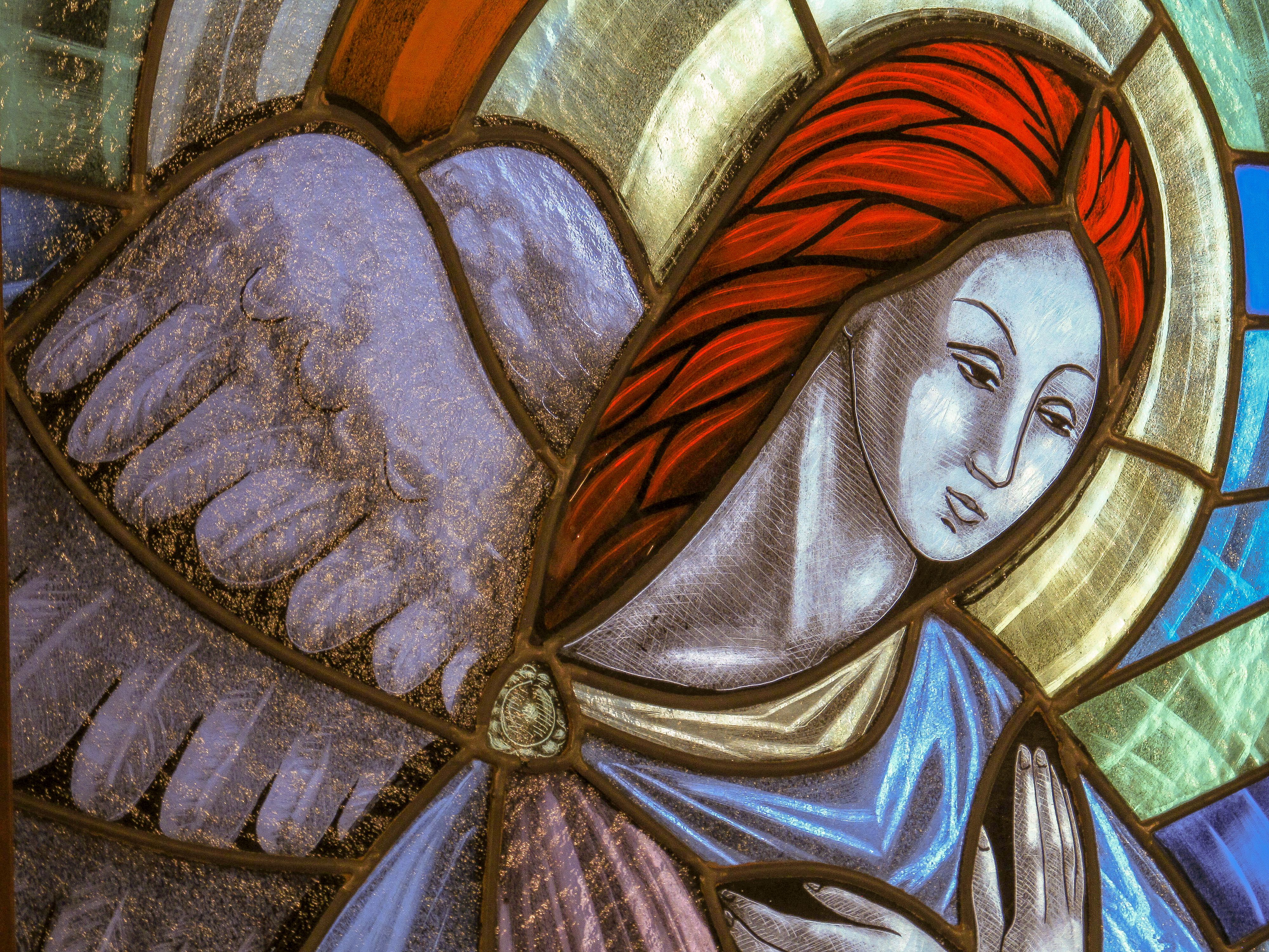 Vibrantly Colored Stained Glass Angel Portrait · Free Stock Photo