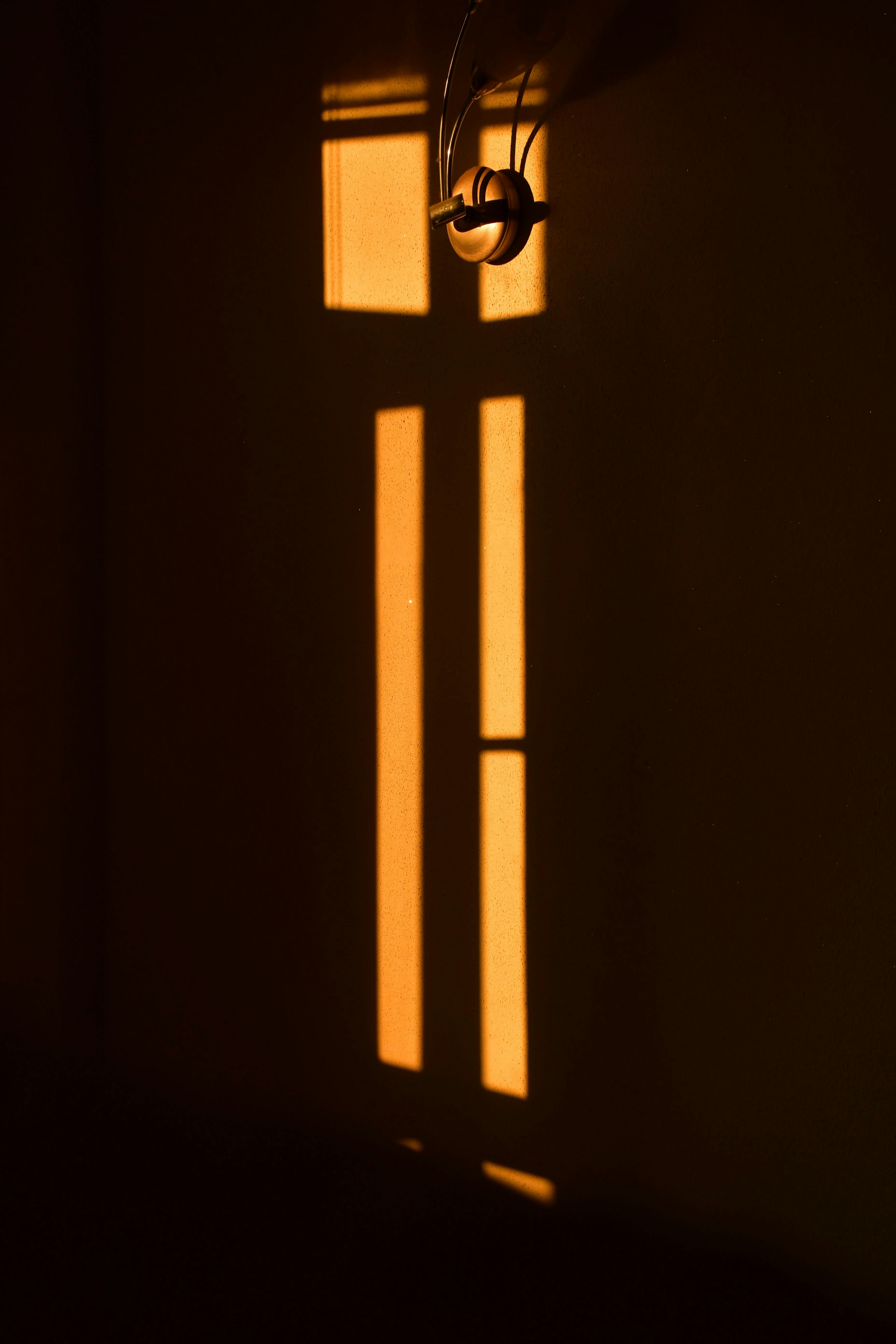 Moody Window Light Casting Shadow Indoors · Free Stock Photo