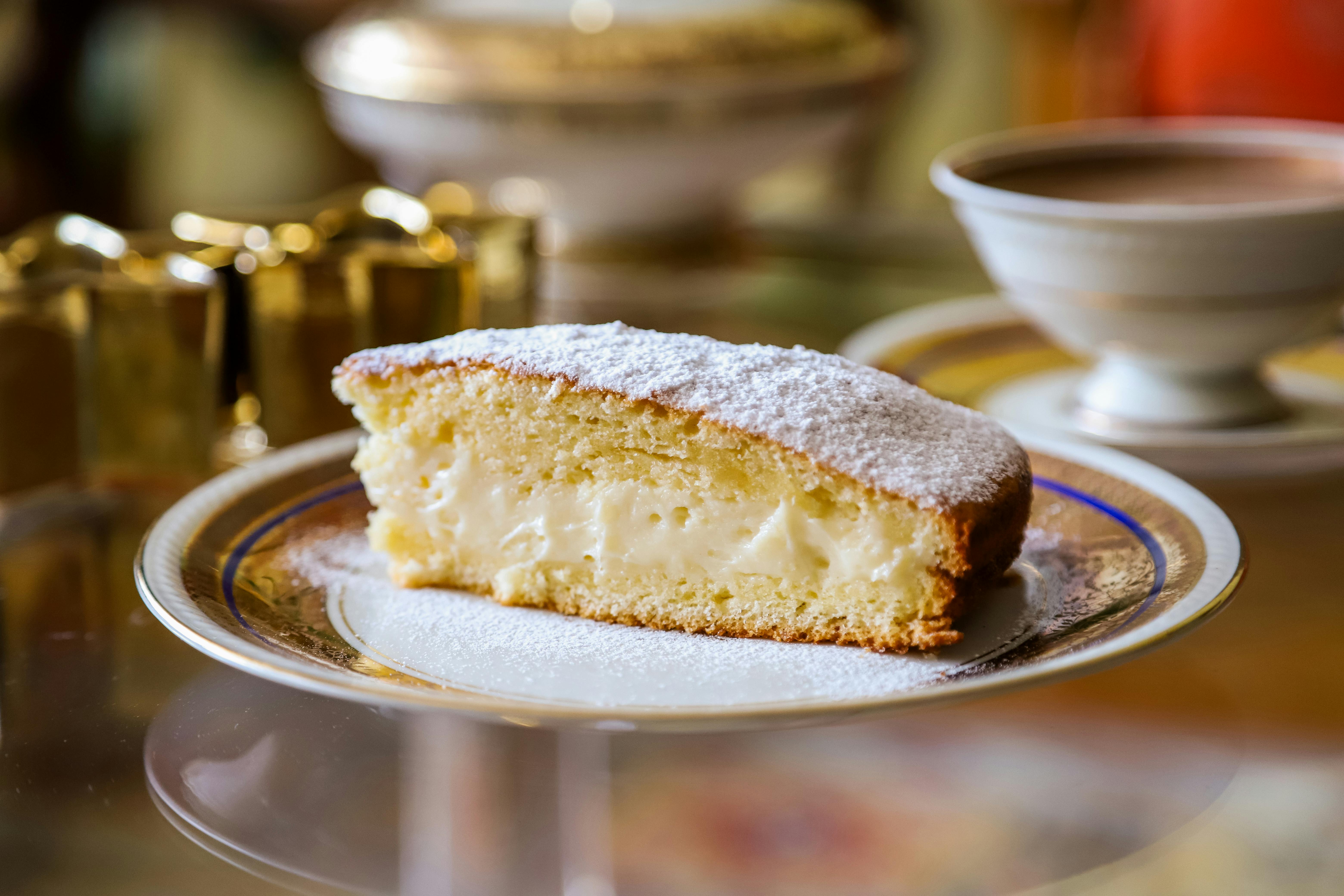 Delicious Cream-Filled Sponge Cake and Coffee · Free Stock Photo